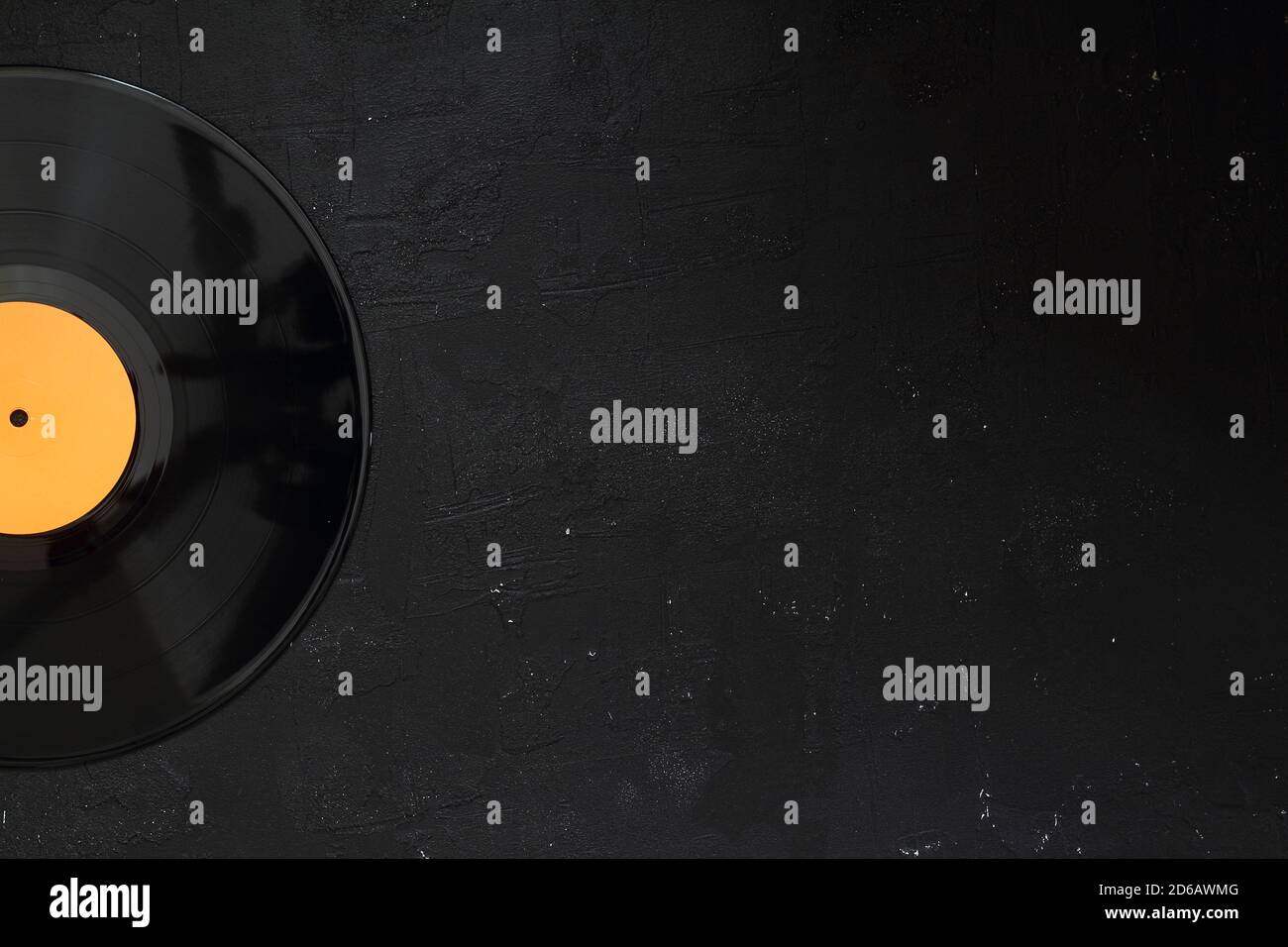 Vinyl record on a black background. Retro style. Top view Stock Photo ...