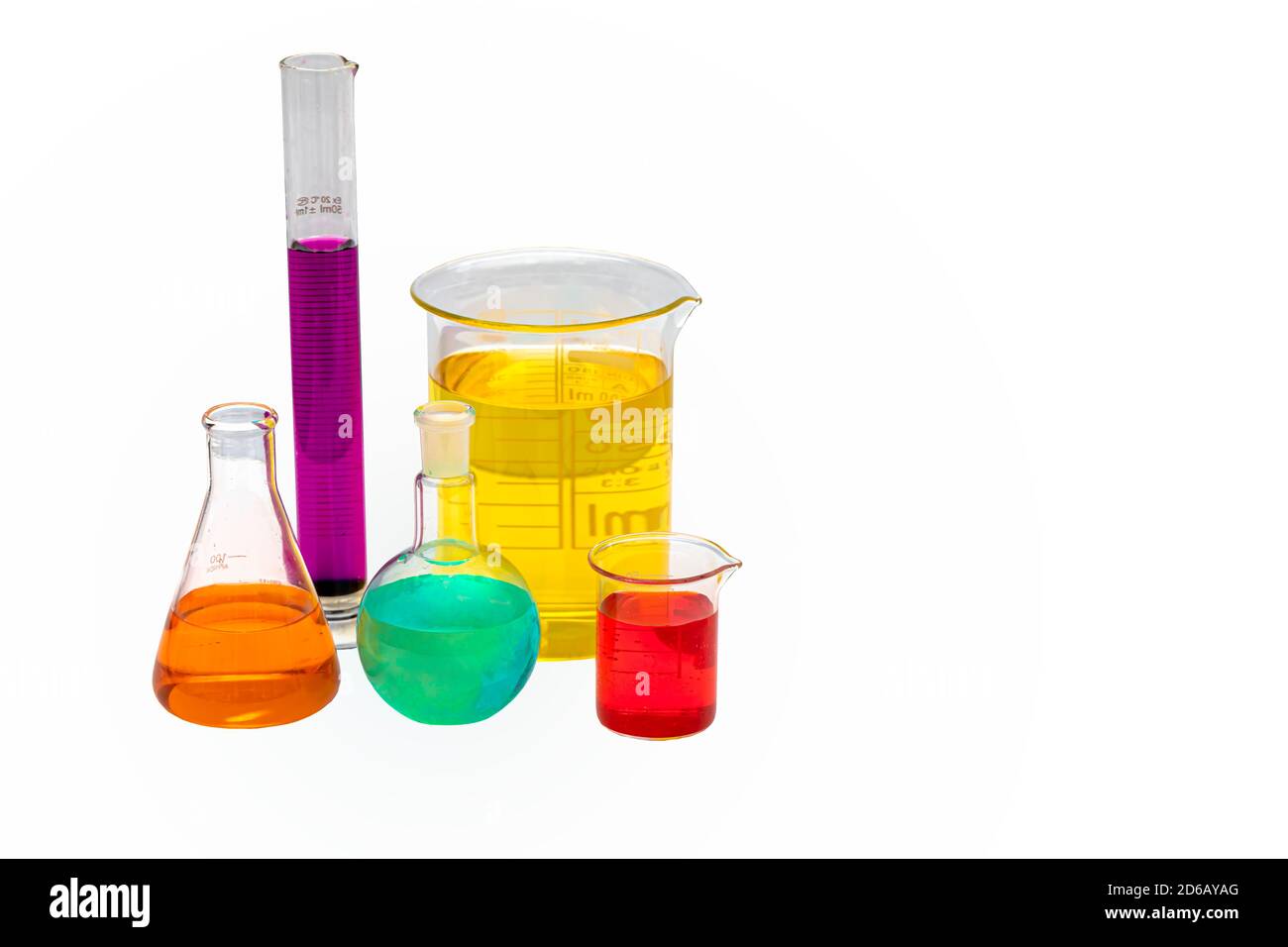 Laboratory glassware with liquids of different colors. Laboratory ...