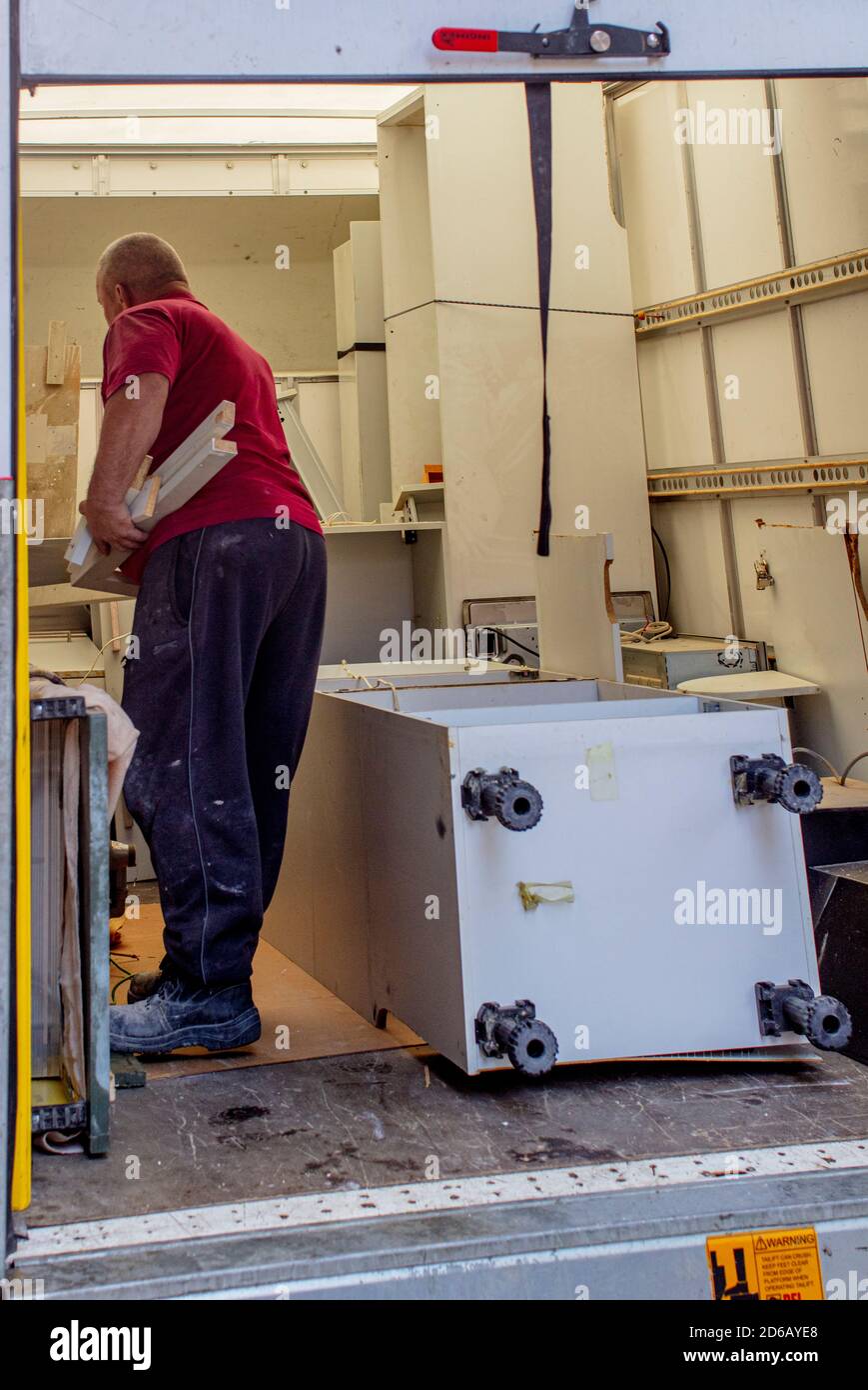 Unloading van hi-res stock photography and images - Alamy