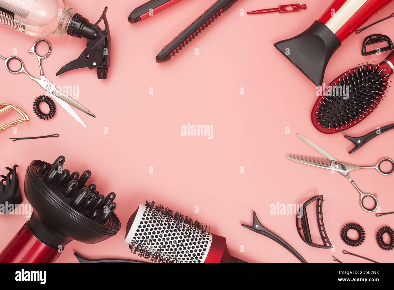 professional items for hairdressing, haircuts on a pink background ...