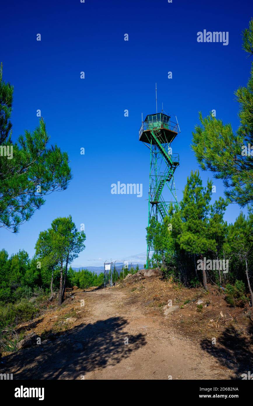High forest watchtower on top of a peak Stock Photo - Alamy