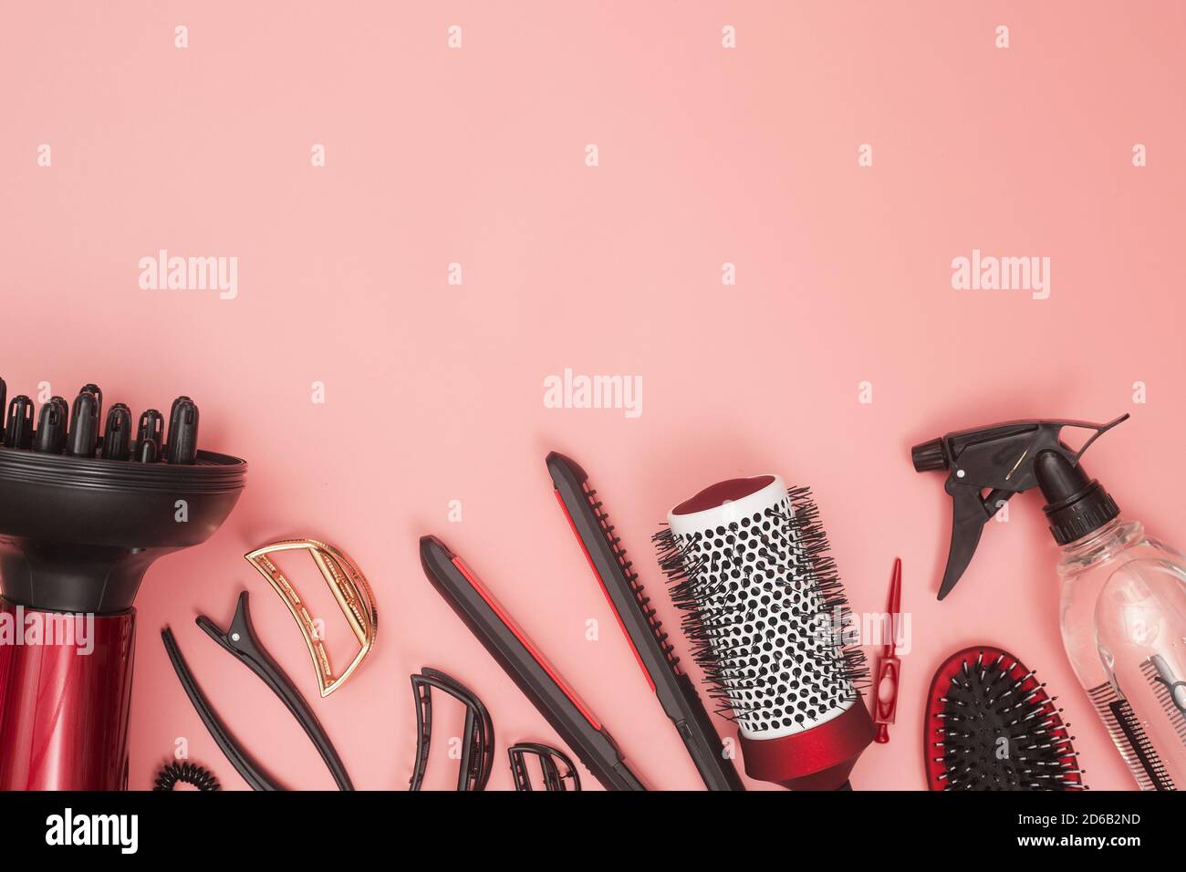 professional items for hairdressing, haircuts on a pink background ...
