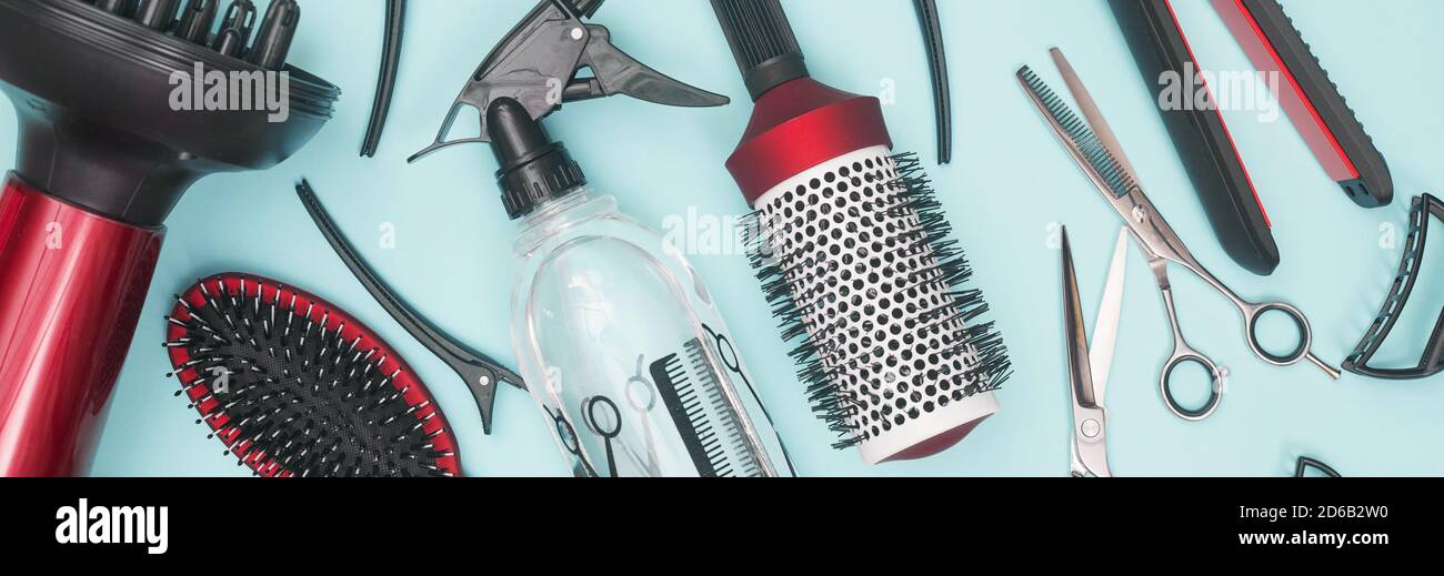 professional items for hairdressing, haircuts on a blue background ...