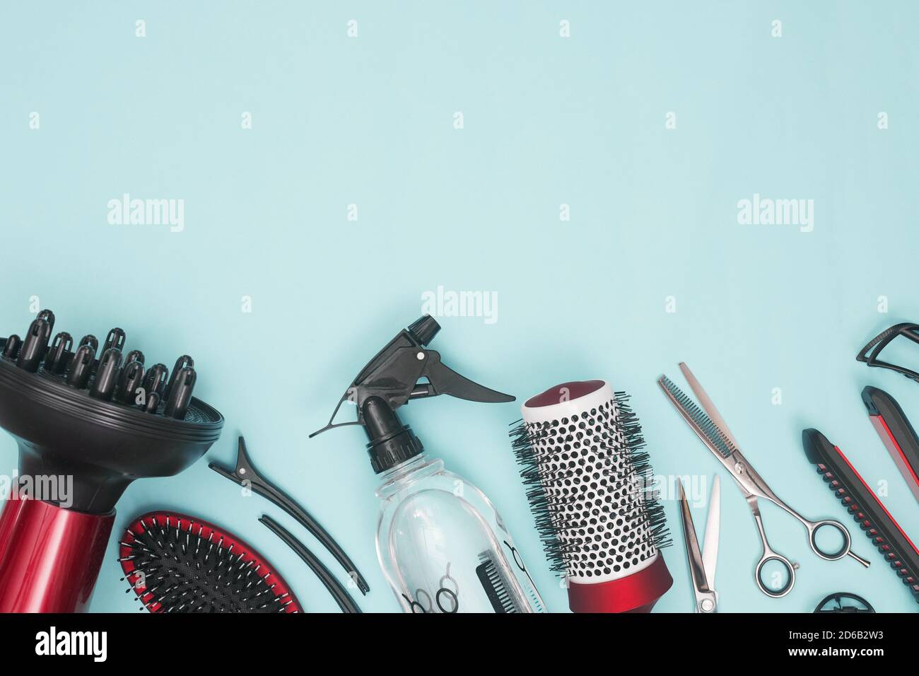 professional items for hairdressing, haircuts on a blue background ...