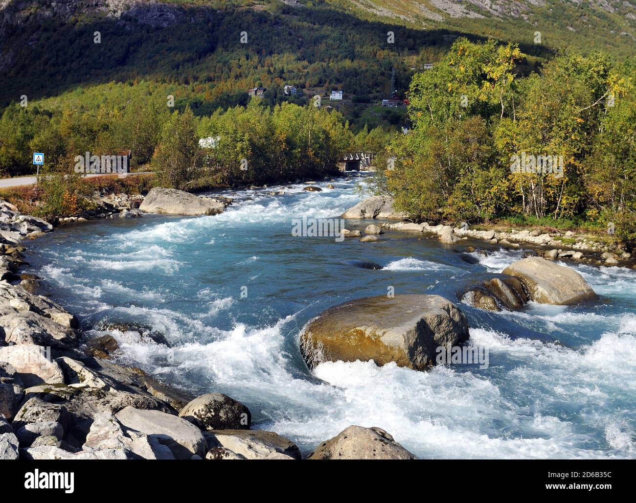 Beautiful Wild River Jostedola With Water Passing Large Rocks And ...