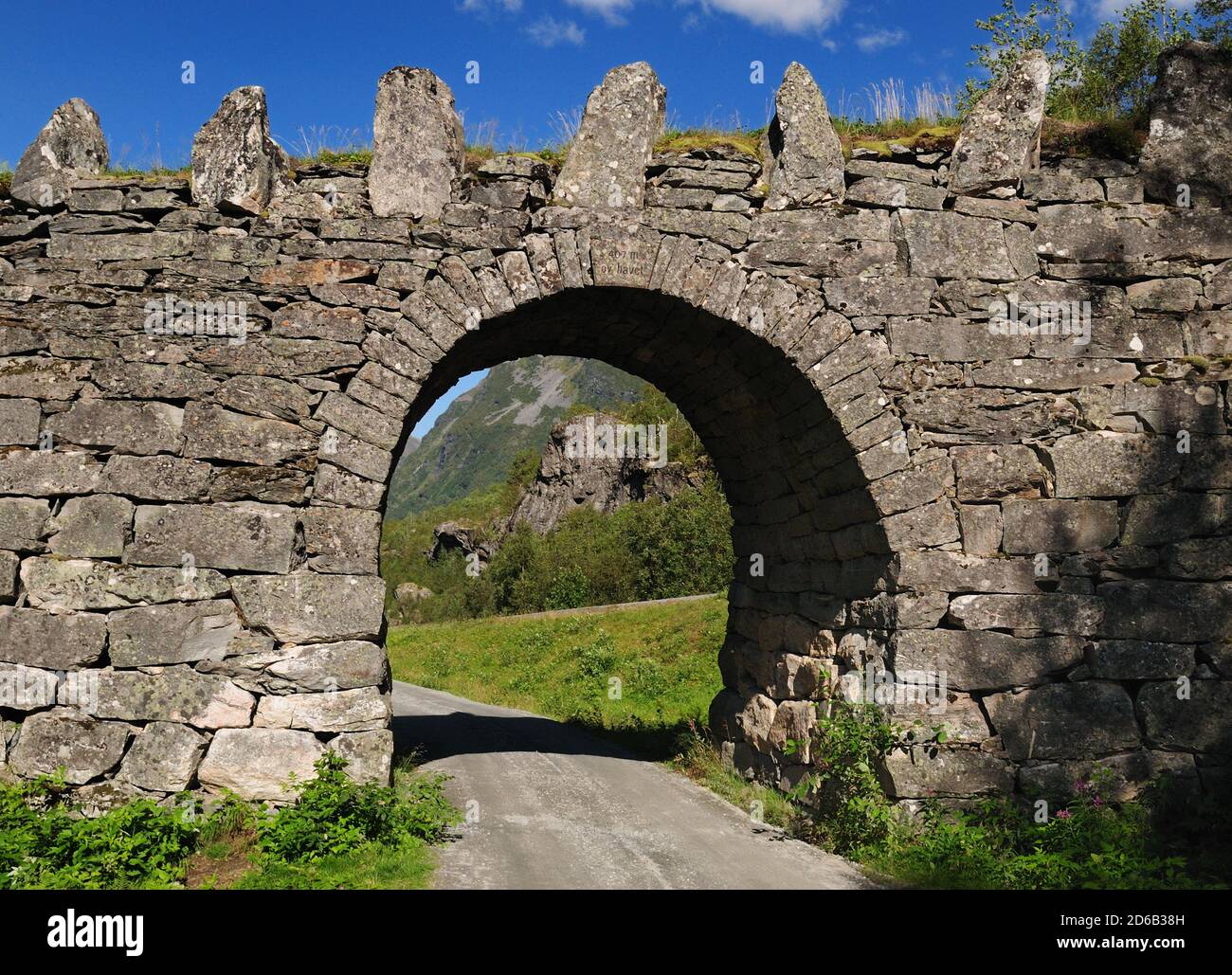 Ancient Stone Bridge Of The Knuten Near Geiranger On A Sunny Summer Day ...