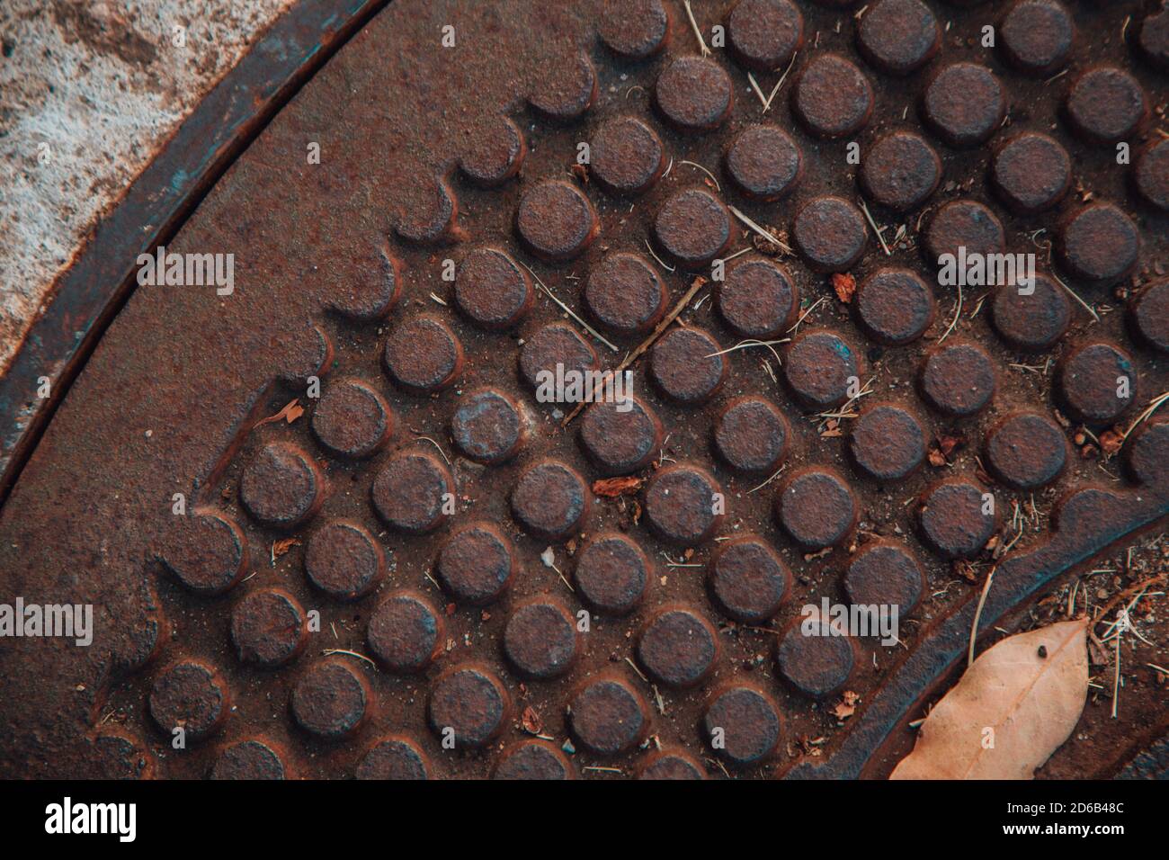 Iron manhole texture in the street Stock Photo - Alamy