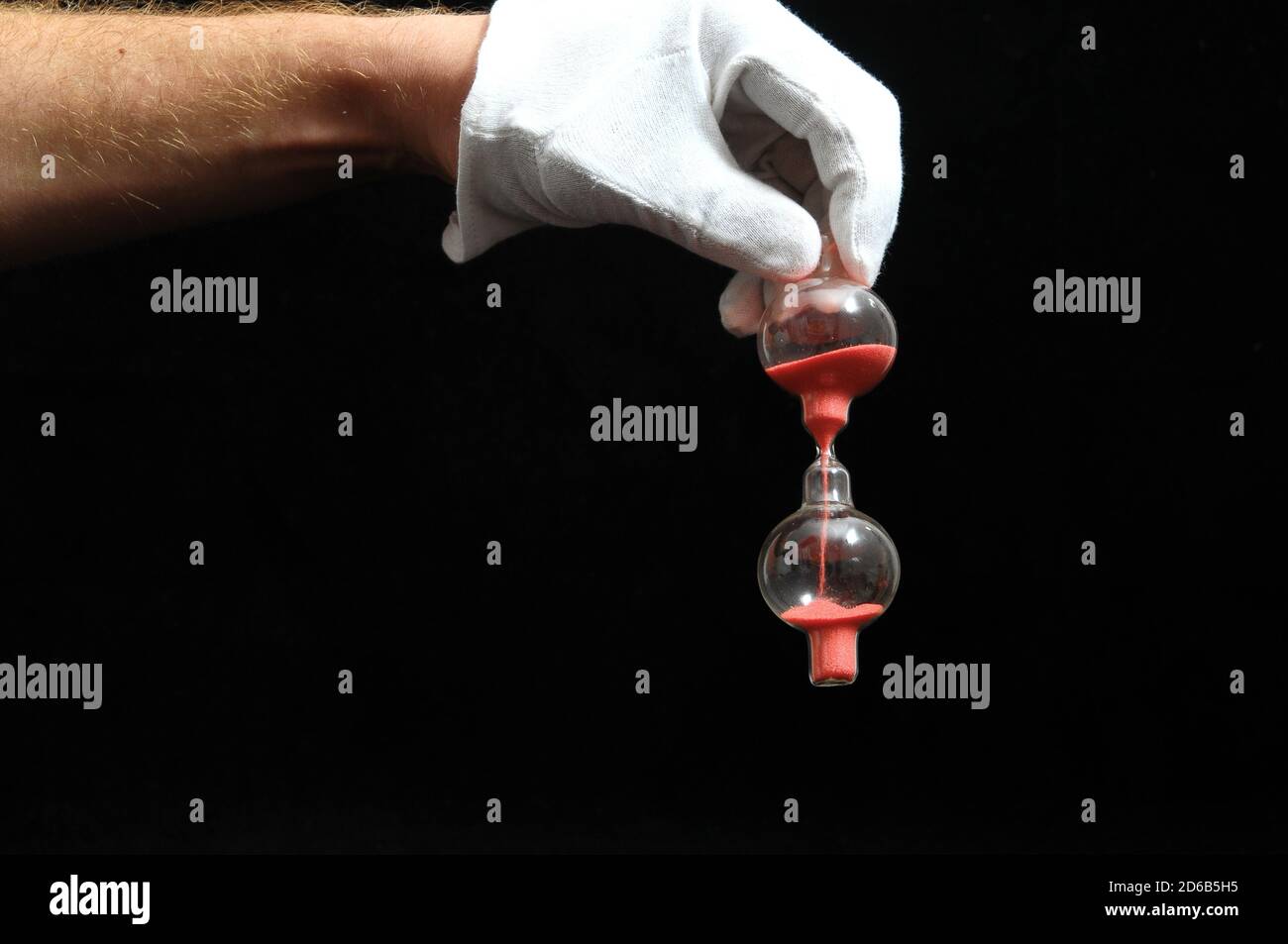 Clock And an Hand Stock Photo - Alamy