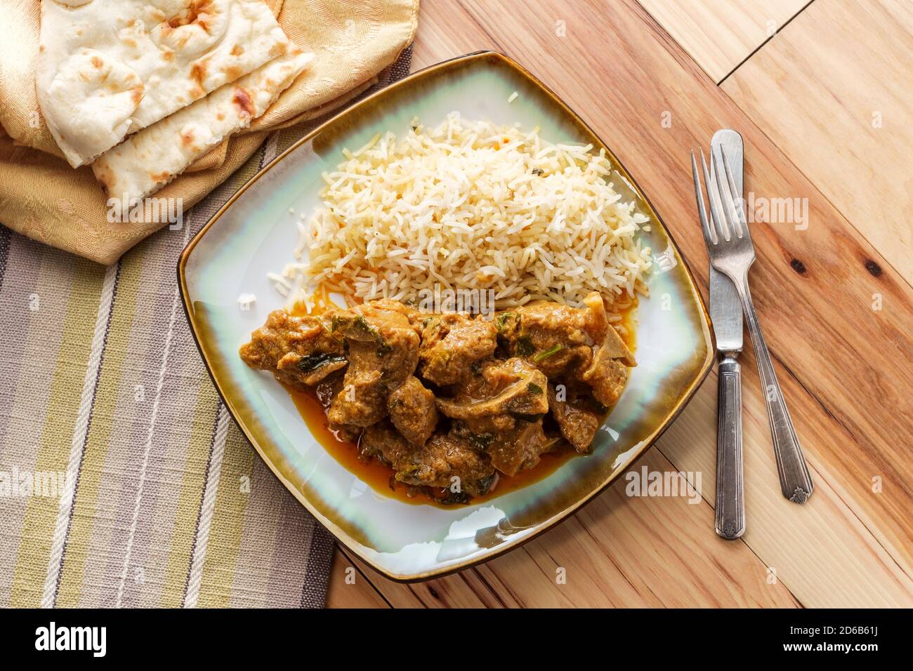 Authentic Indian goat korma curry with jasmine rice Stock Photo - Alamy
