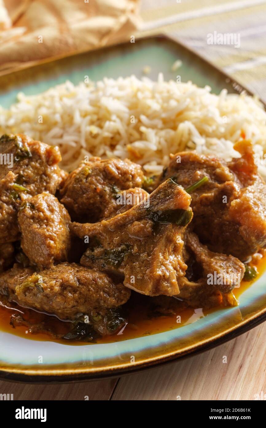 Authentic Indian goat korma curry with jasmine rice Stock Photo - Alamy