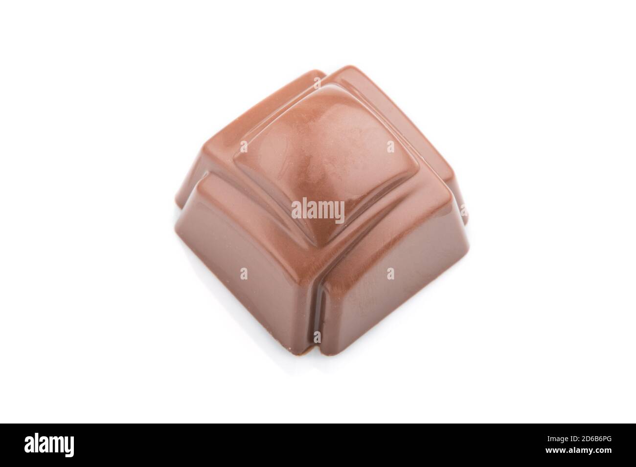Single chocolate candy isolated on white background. side view, close ...