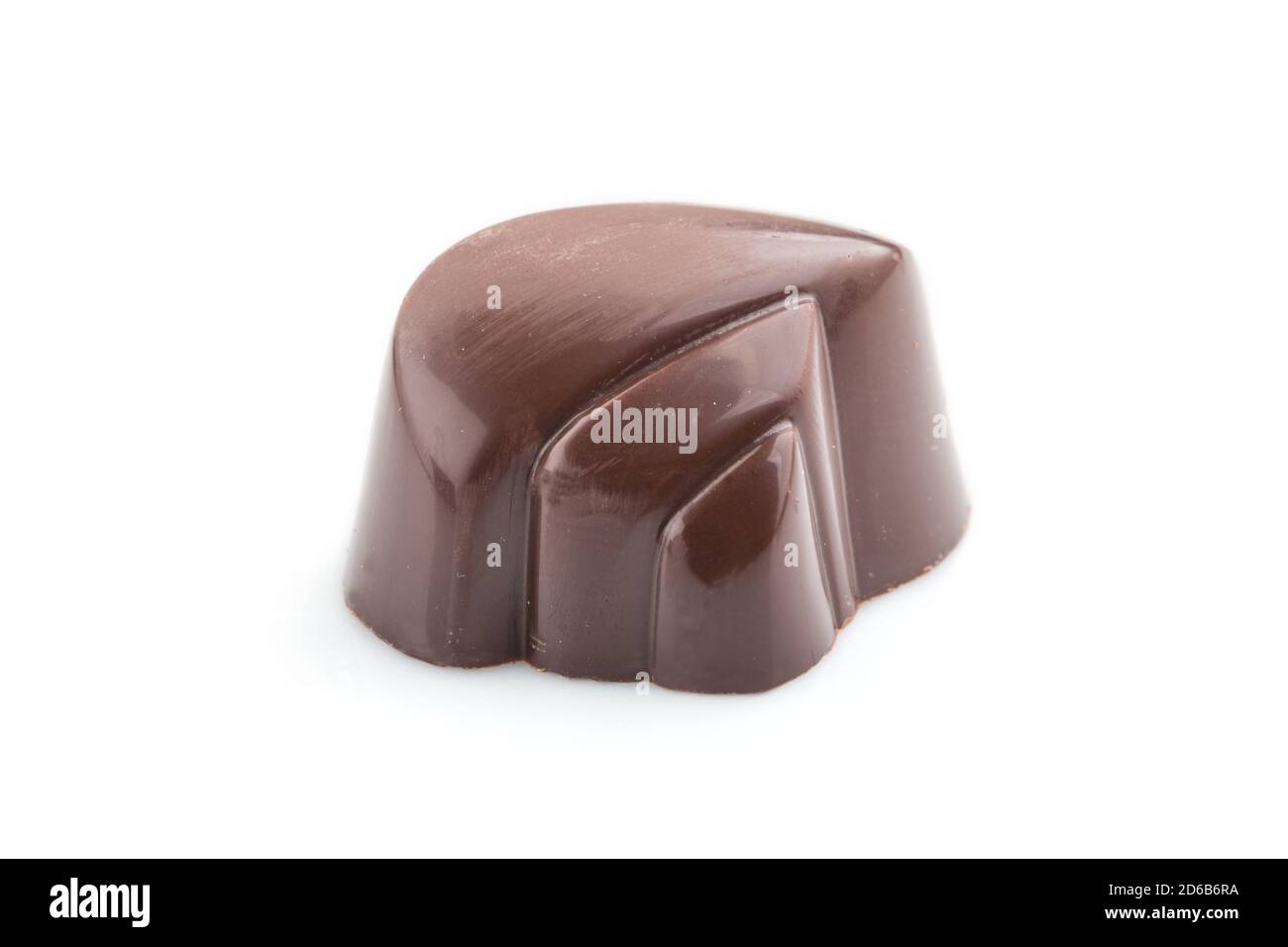 Single chocolate candy isolated on white background. side view, close ...