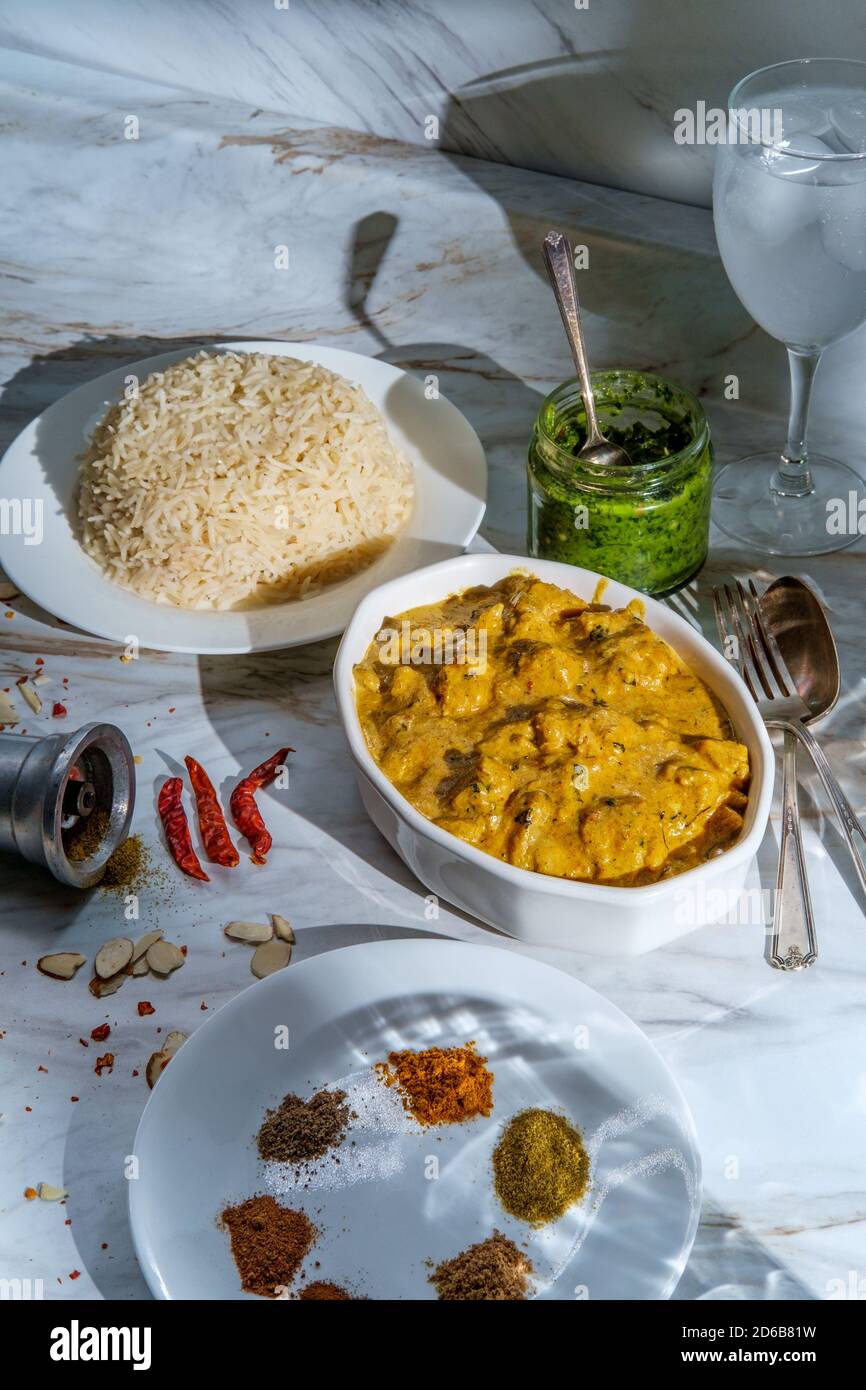 Authentic Indian almond chicken korma curry dinner with basmati rice ...