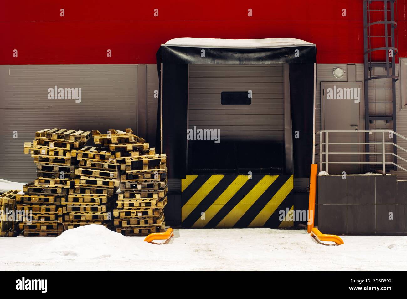 Cargo lift for storage with yellow black diagonal lines warning sign ...