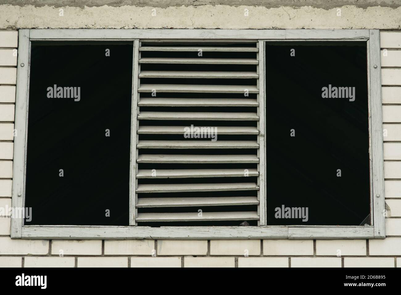 An old wooden window in a brick wall. White Stock Photo - Alamy