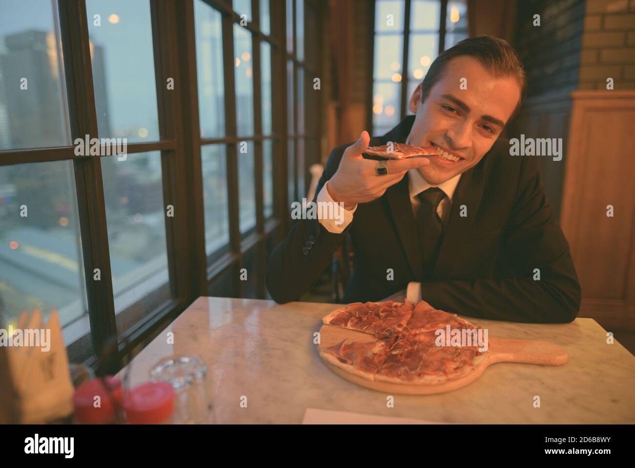 Man biting table hi-res stock photography and images - Alamy