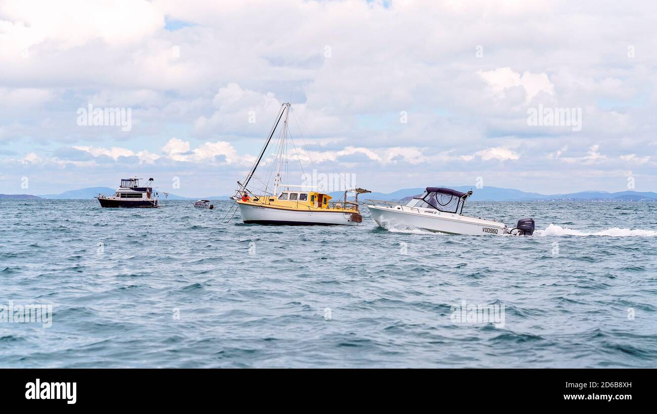 Yeppoon, Queensland, Australia - December 2019: A speed boat passes ...