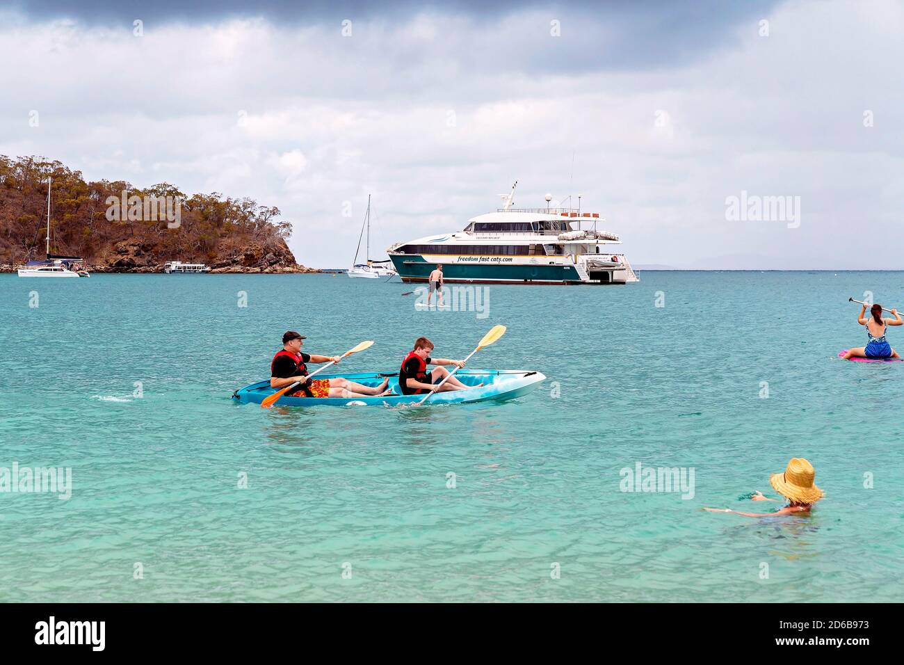 Yeppoon, Queensland, Australia - December 2019: Father and son kayaking ...