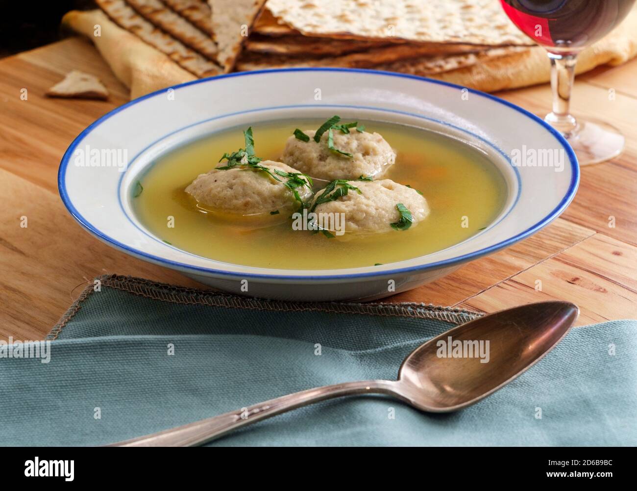 Delicious Matzoh ball soup with crackers and wine Stock Photo - Alamy