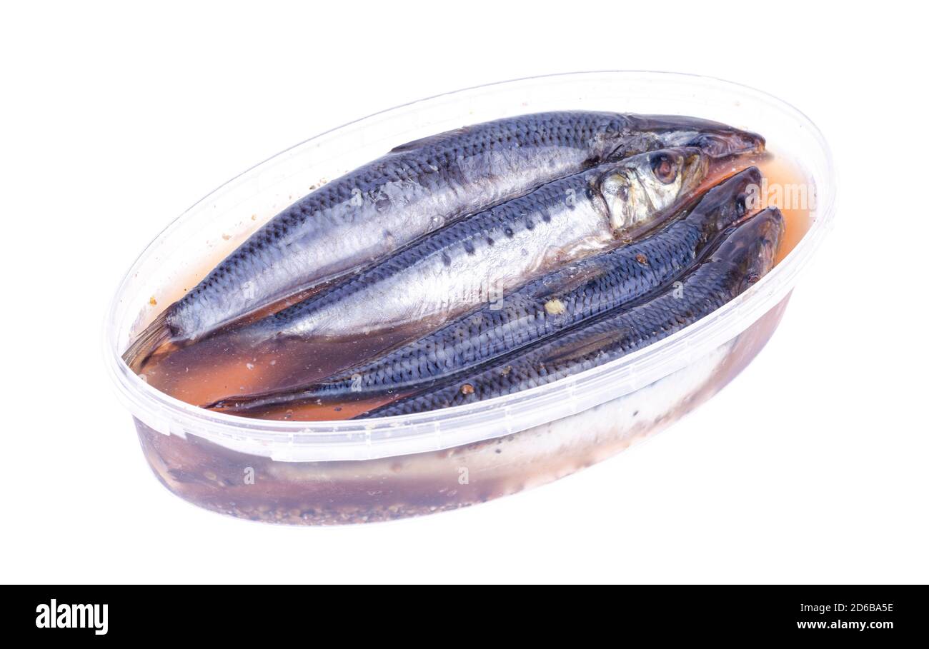 Pickled salted fish, herring in plastic. Photo Stock Photo - Alamy