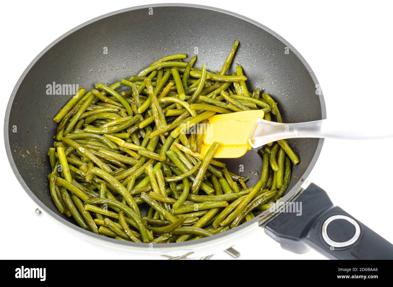 Frying pan with fried garlic arrows. Photo Stock Photo - Alamy