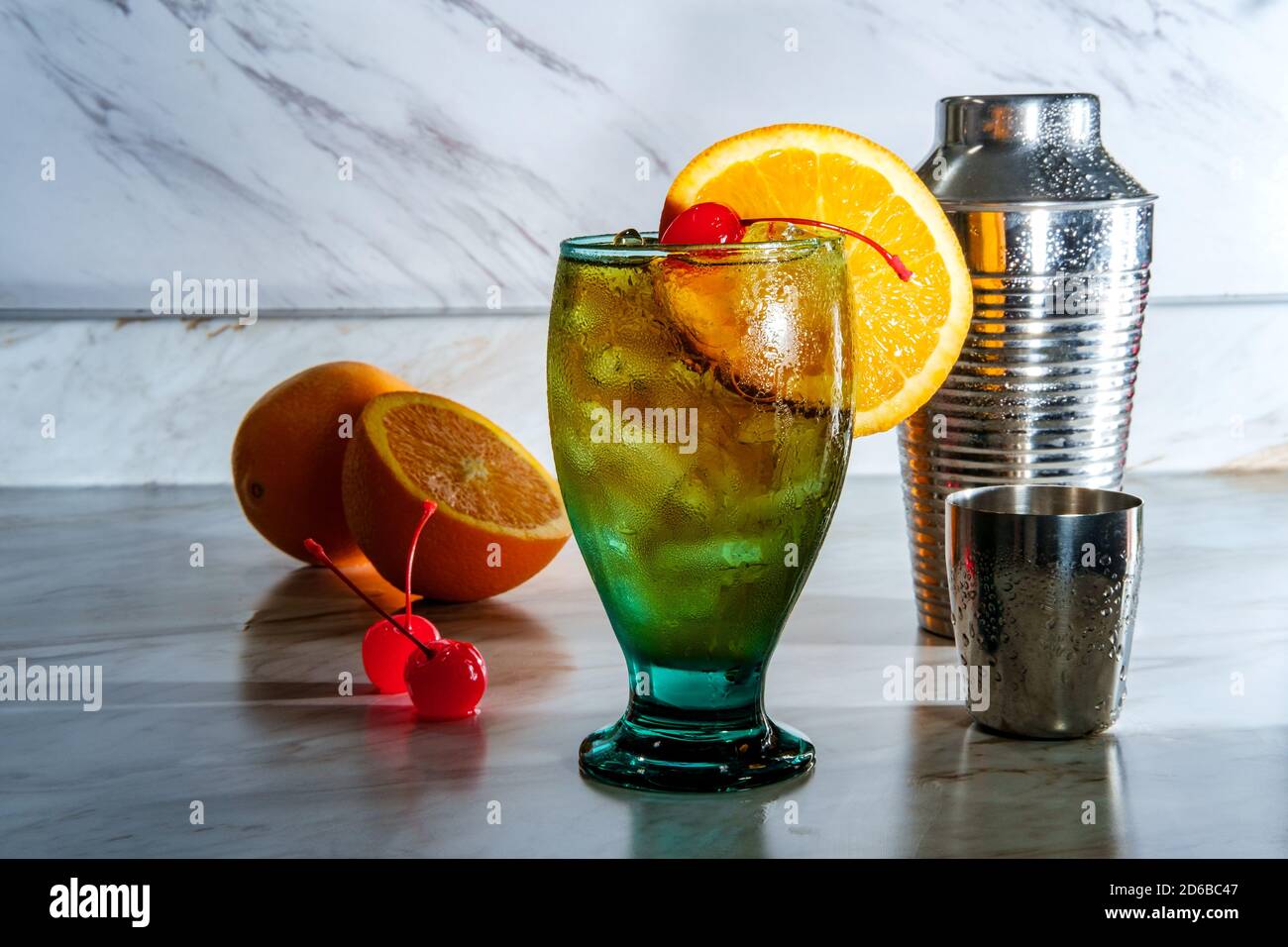 Old fashioned whiskey cocktail on the rocks with orange slice and ...