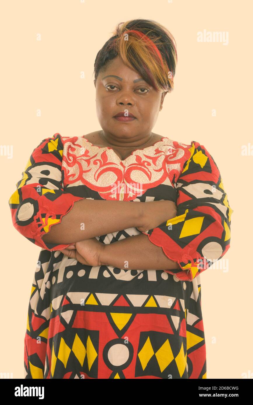 Studio shot of fat black African woman with arms crossed Stock Photo ...