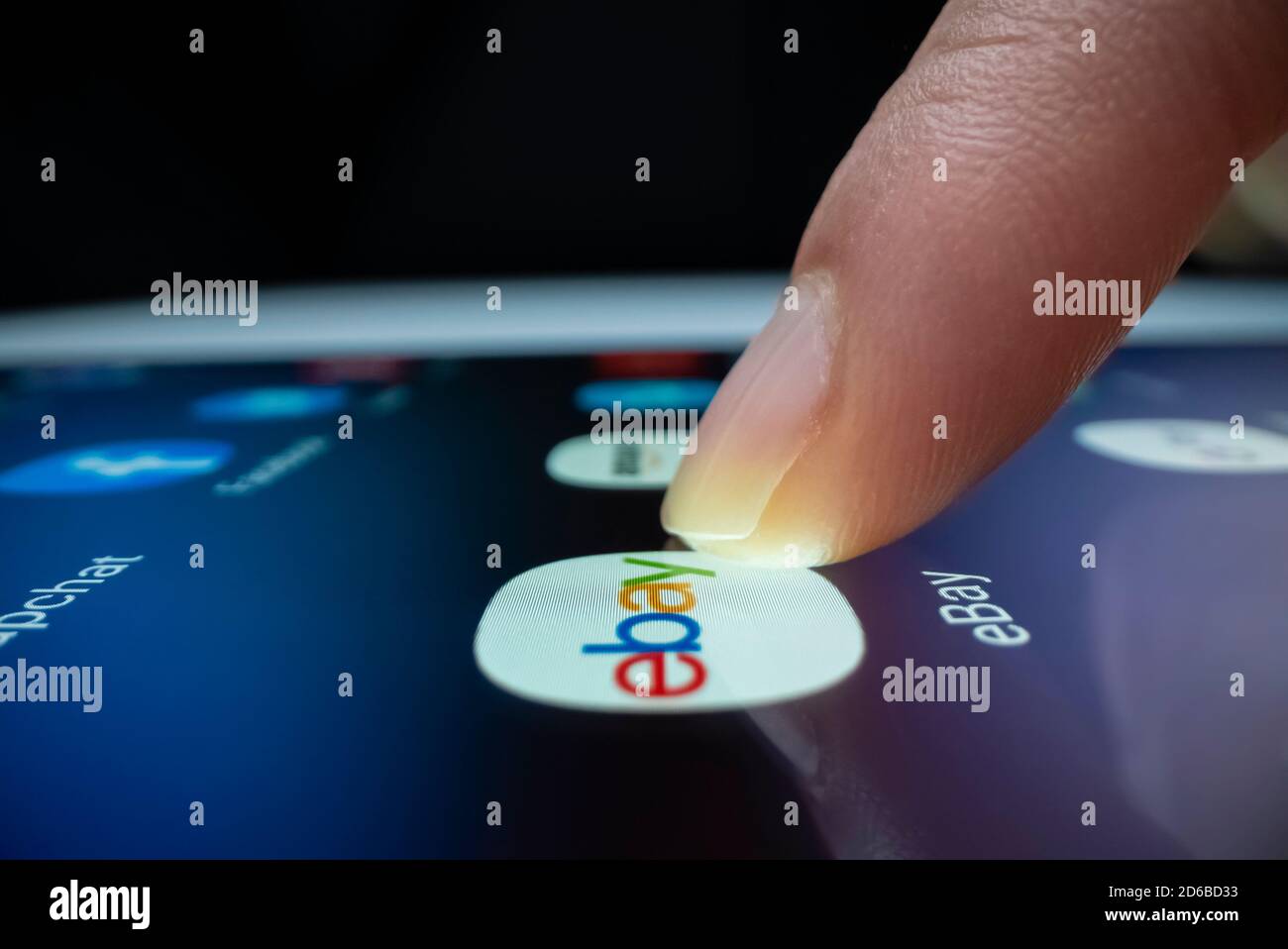Wide angle close-up view of clicking ebay app icon Stock Photo - Alamy