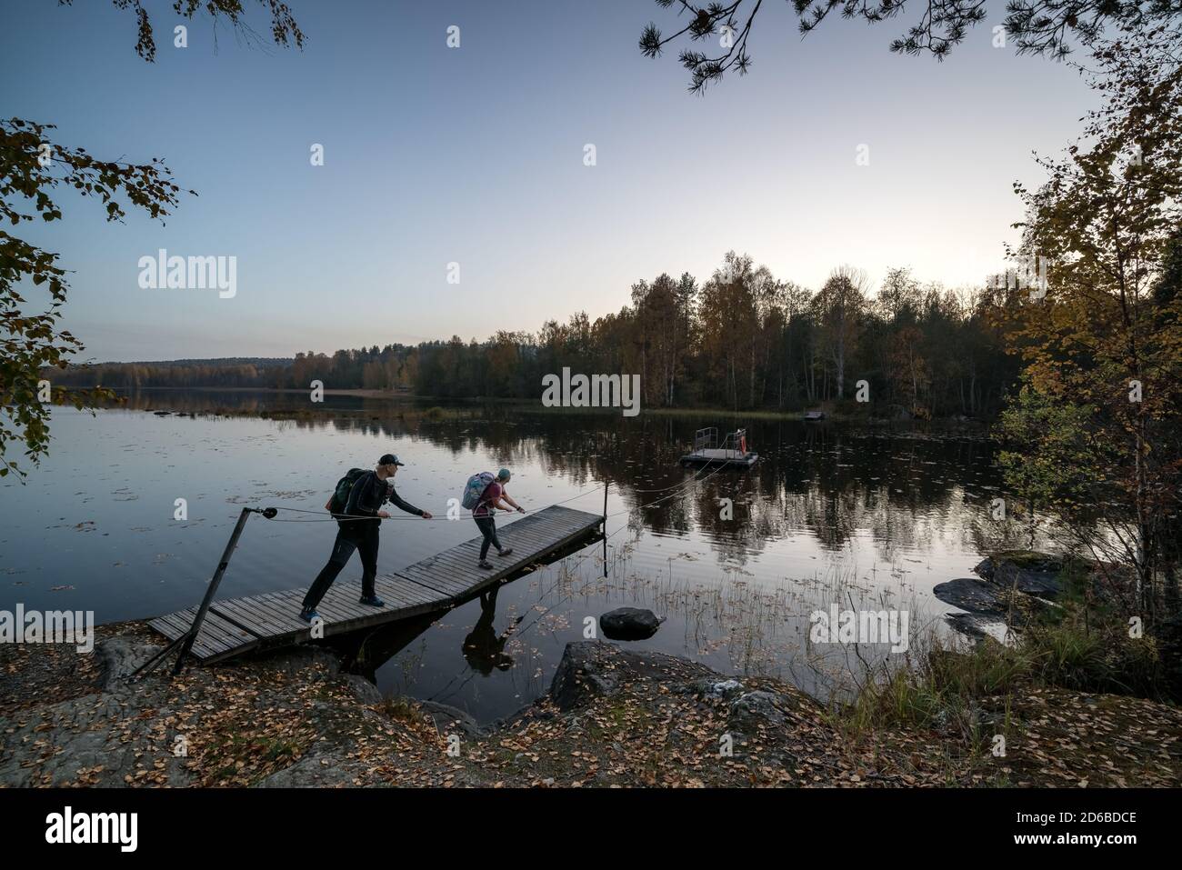 Pulling the ferry towards the shore in Koli National Park, Joensuu ...