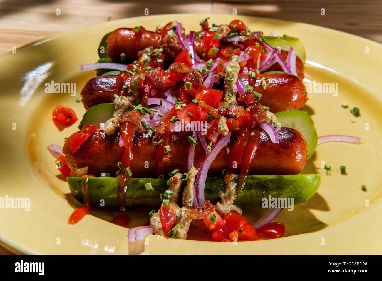 Pickle for a bun gluten free hot dogs with sliced red onions tomatoes ...