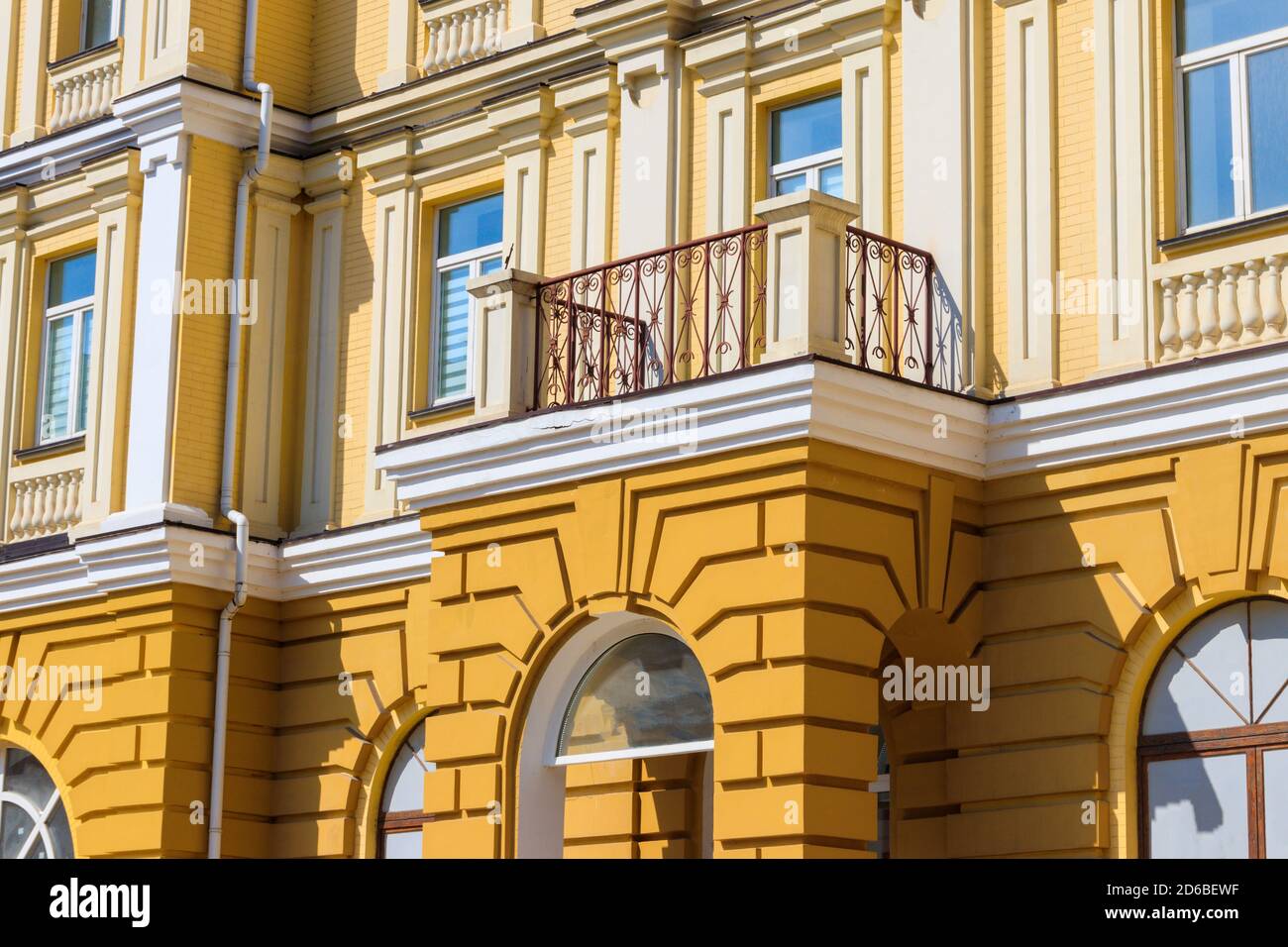 Facade of the modern multistory building in classical style close-up ...