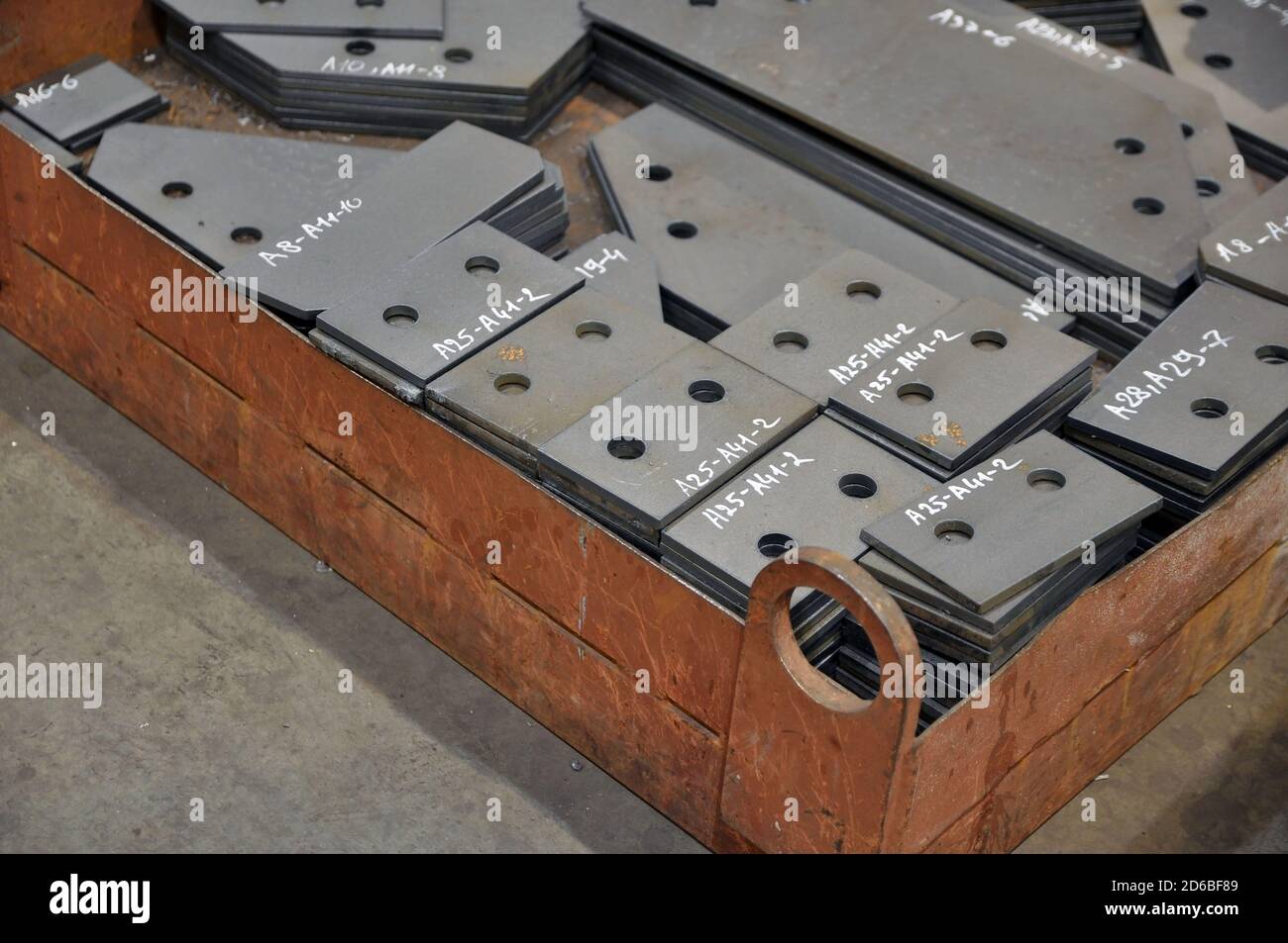 Metal cutting. Sorting and storage of finished parts with marking Stock ...