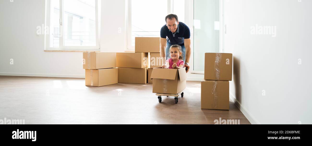 Happy People Moving Into New House Or Home Stock Photo - Alamy