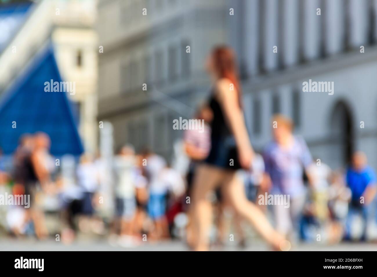 Blurred defocused abstract background of people walking on the city ...
