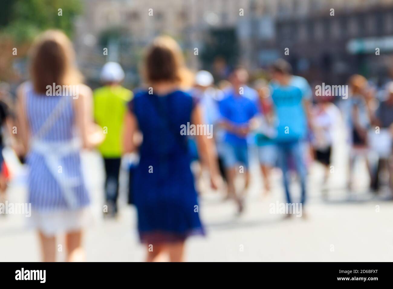 Blurred defocused abstract background of people walking on the city ...