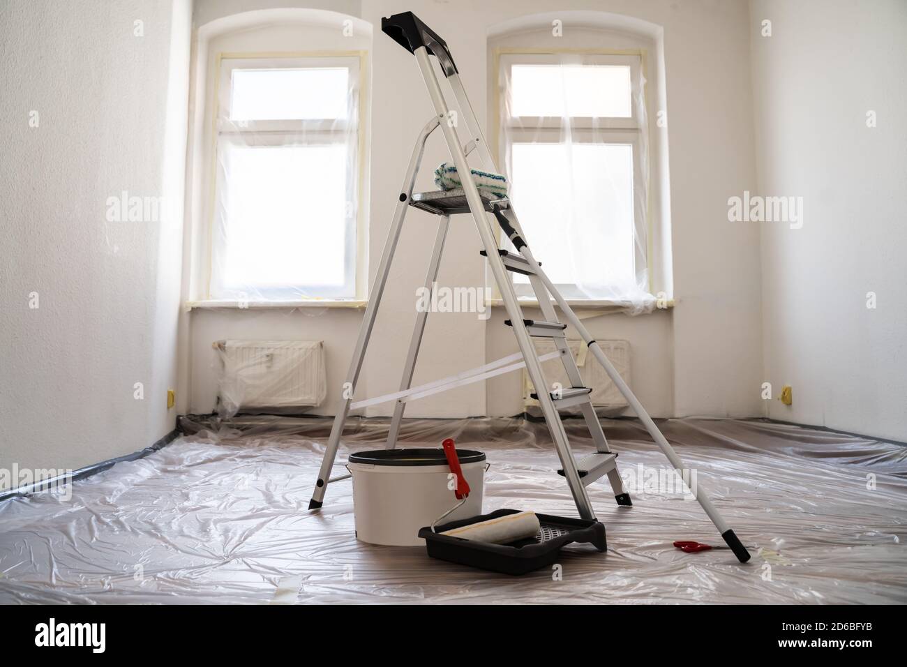 House Wall Paint Inside. Maintenance Painting Service Stock Photo - Alamy