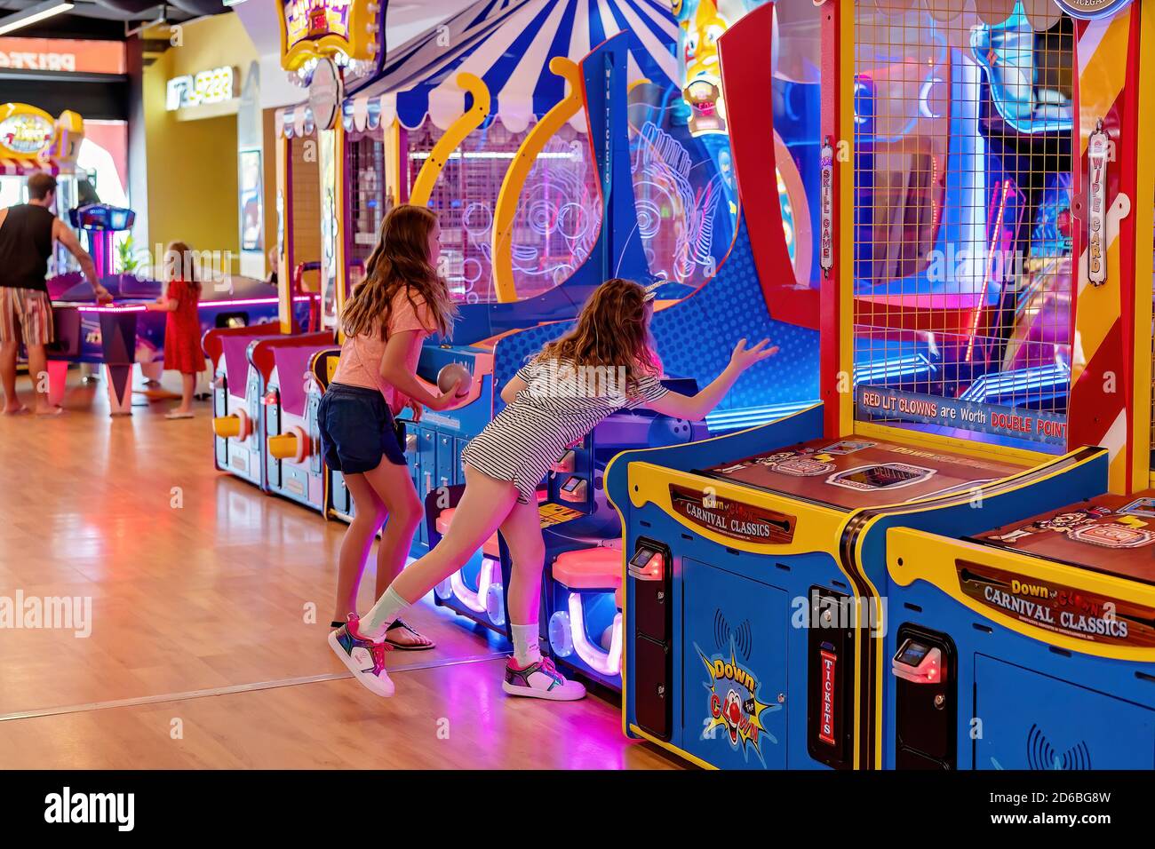 Children playing arcade game in hi-res stock photography and images - Alamy
