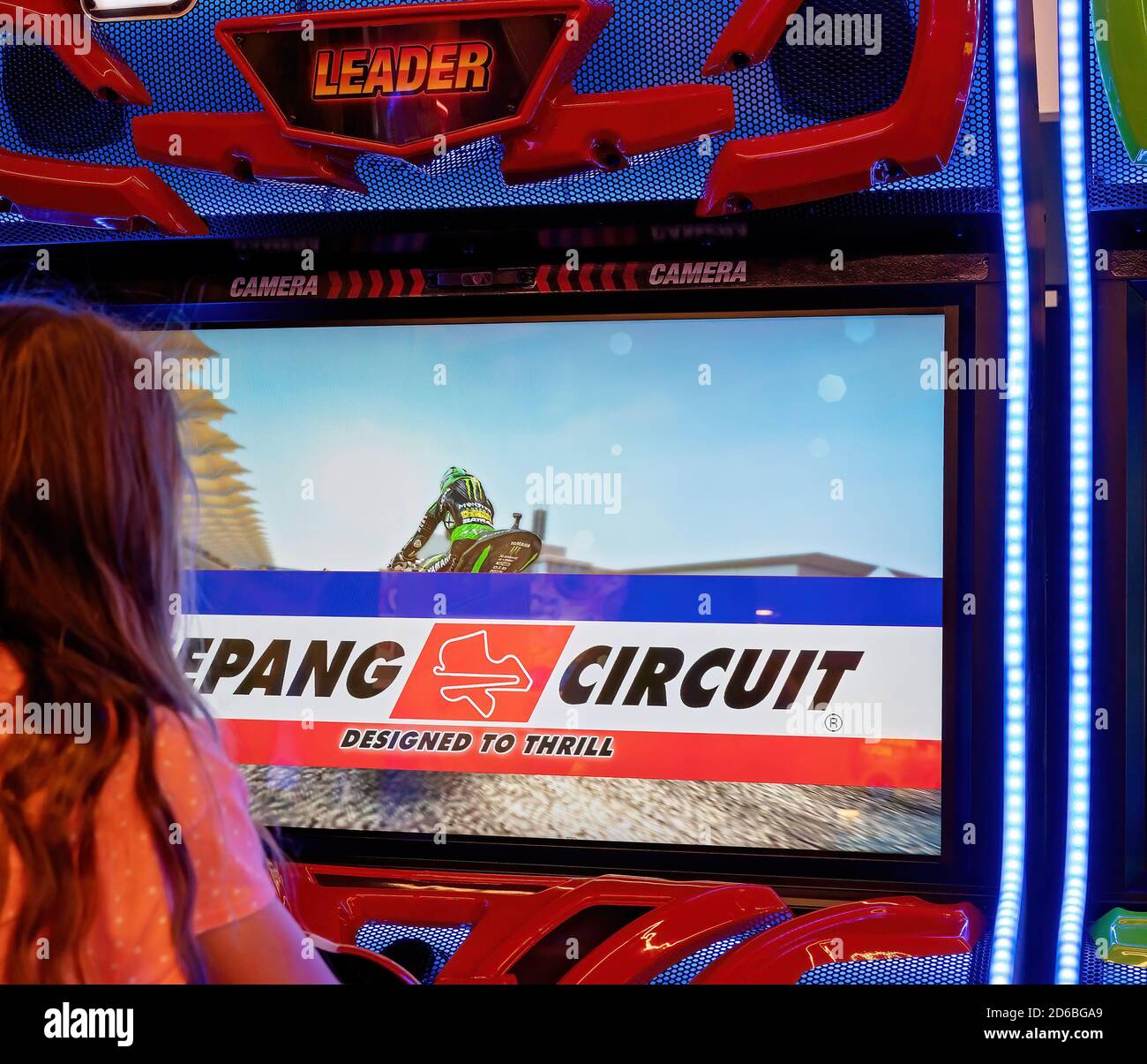 Mackay, Queensland, Australia - February 2020: A young girl riding a ...