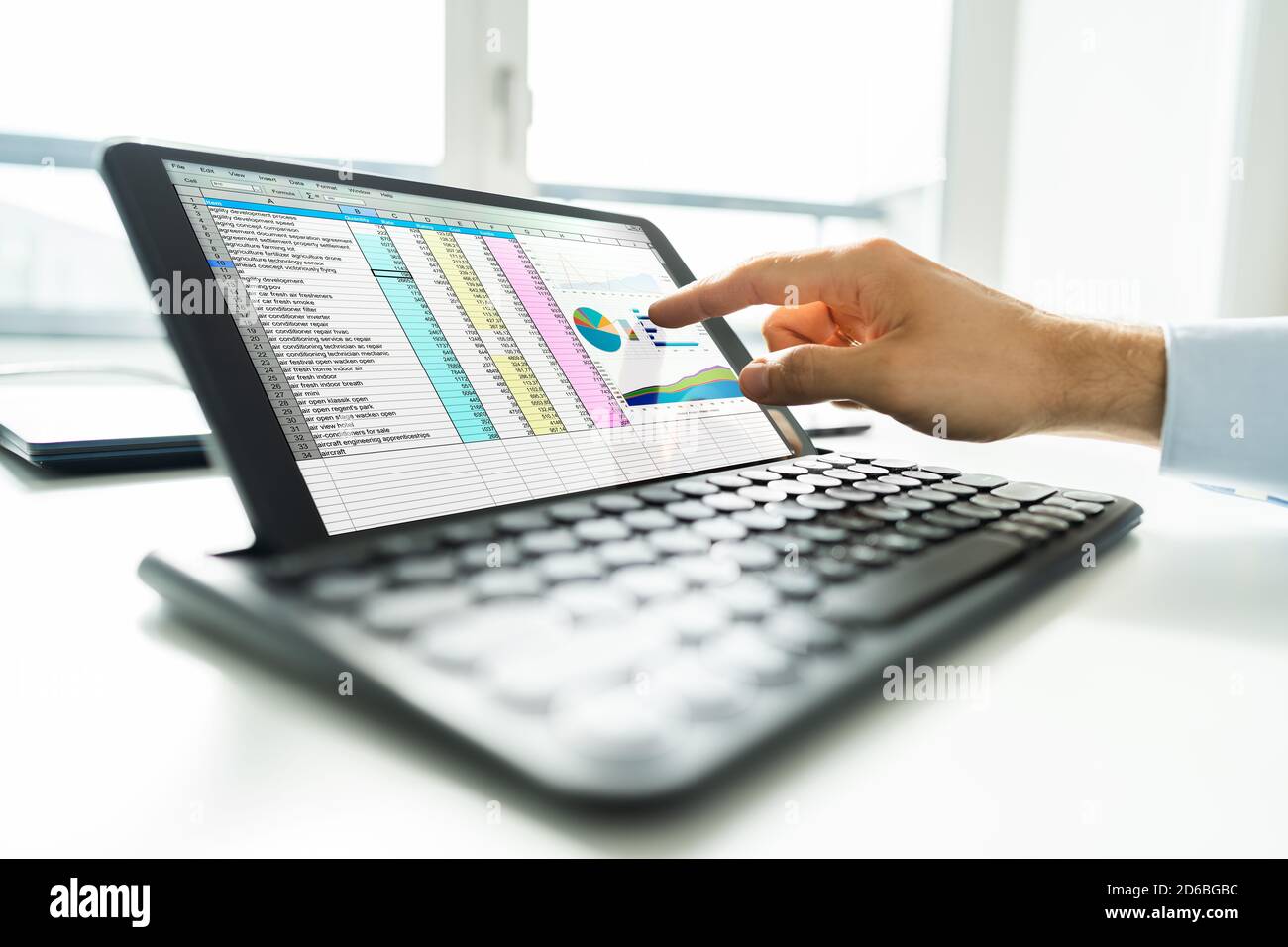 Analyst using spreadsheet report hi-res stock photography and images ...
