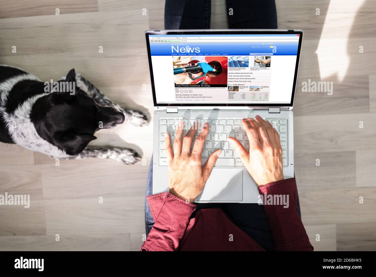 Woman reading newspaper on computer hi-res stock photography and images ...