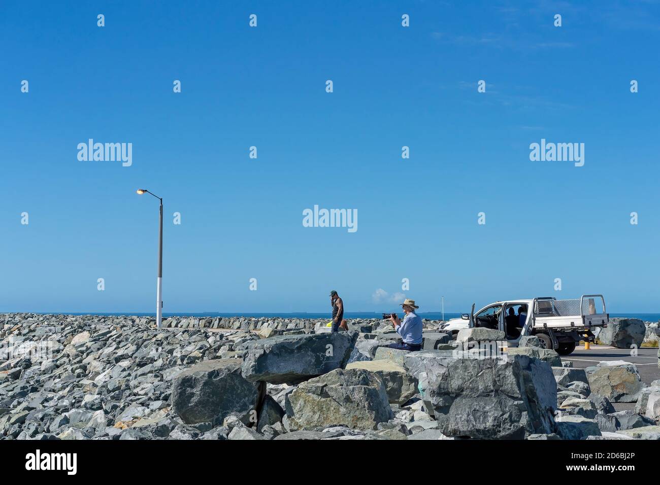 Mackay, Queensland, Australia - June 2020: Men enjoying the atmosphere ...