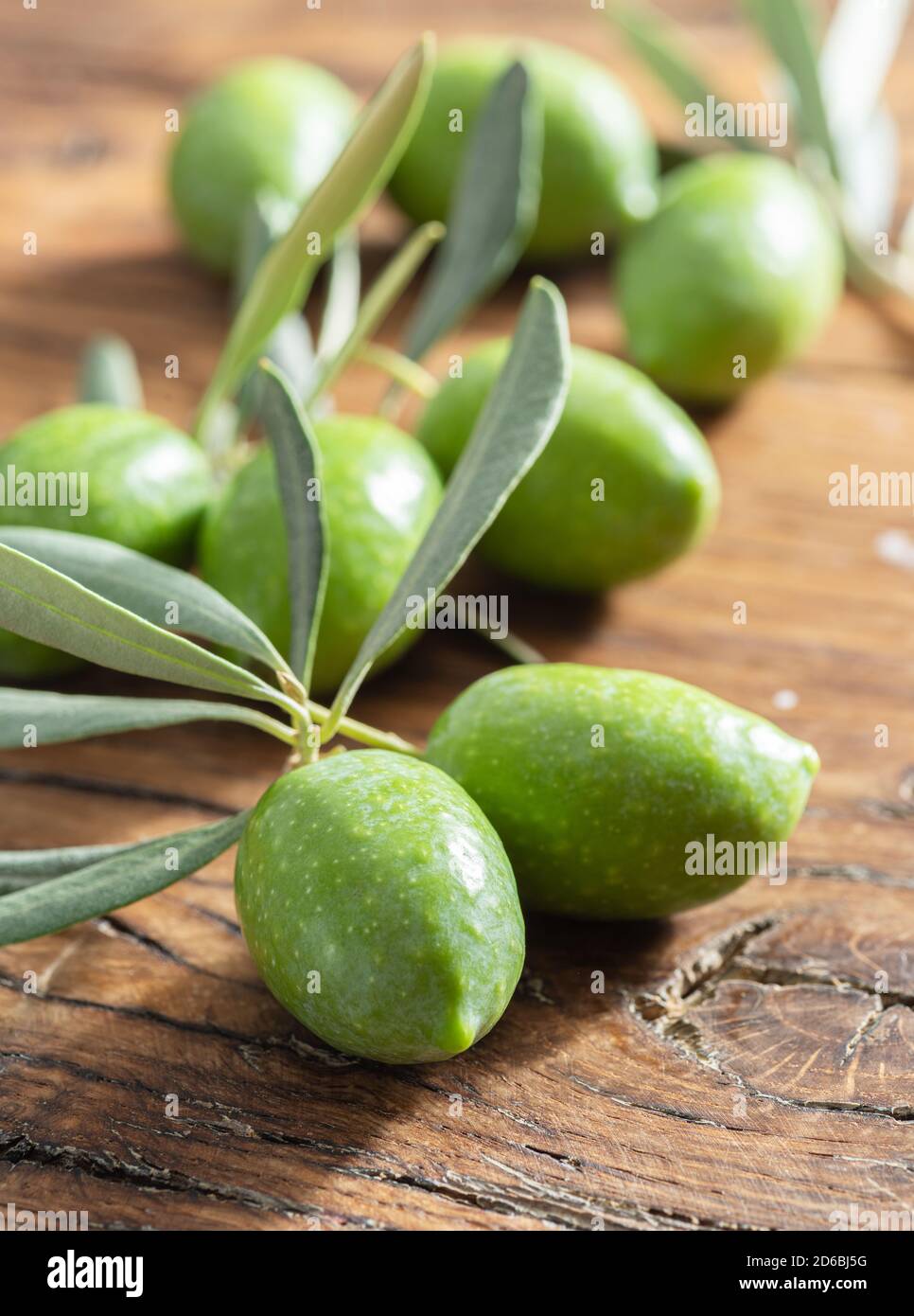 Group olives on wooden hi-res stock photography and images - Alamy