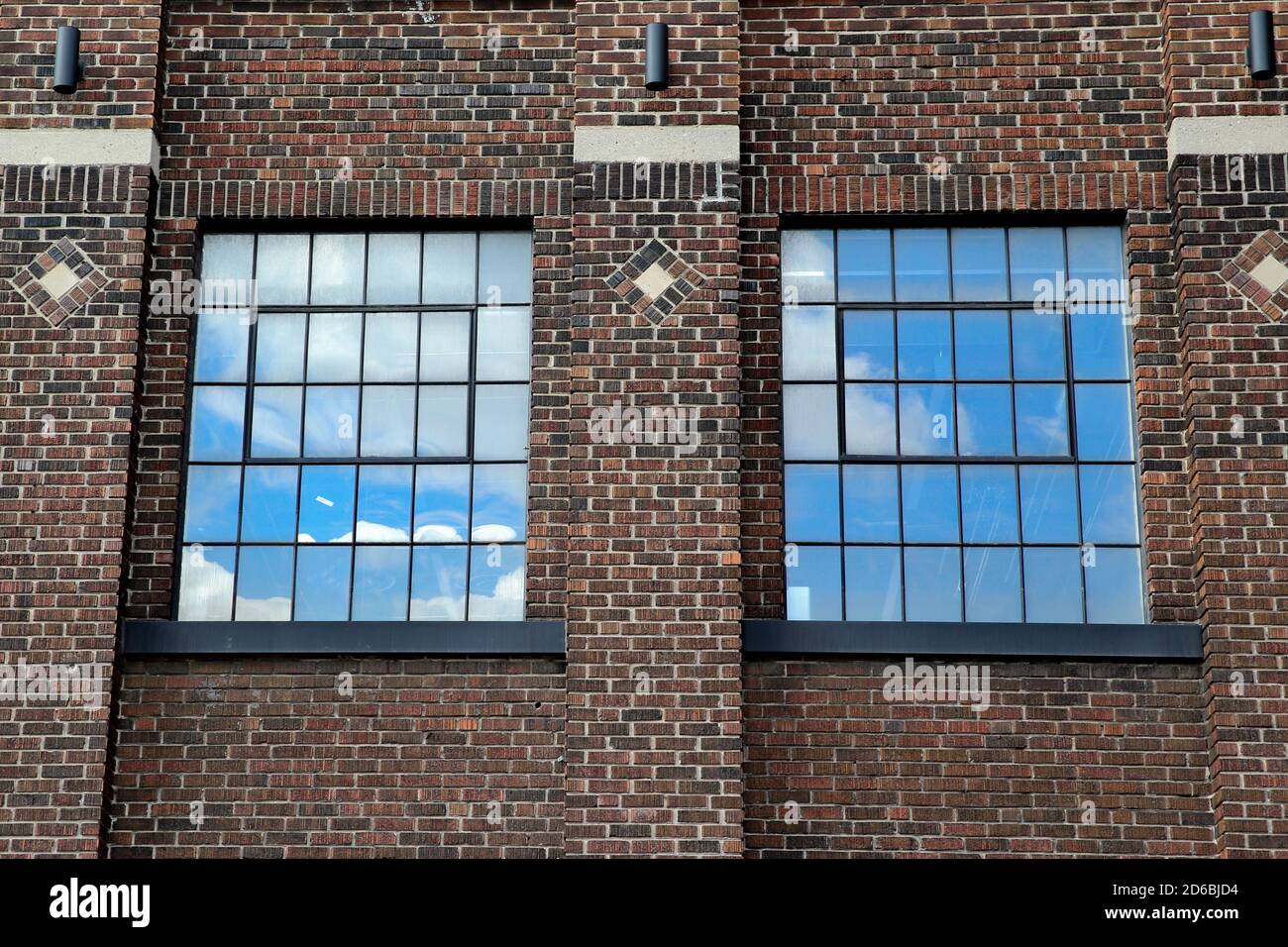 Windows with a sky reflection Stock Photo - Alamy