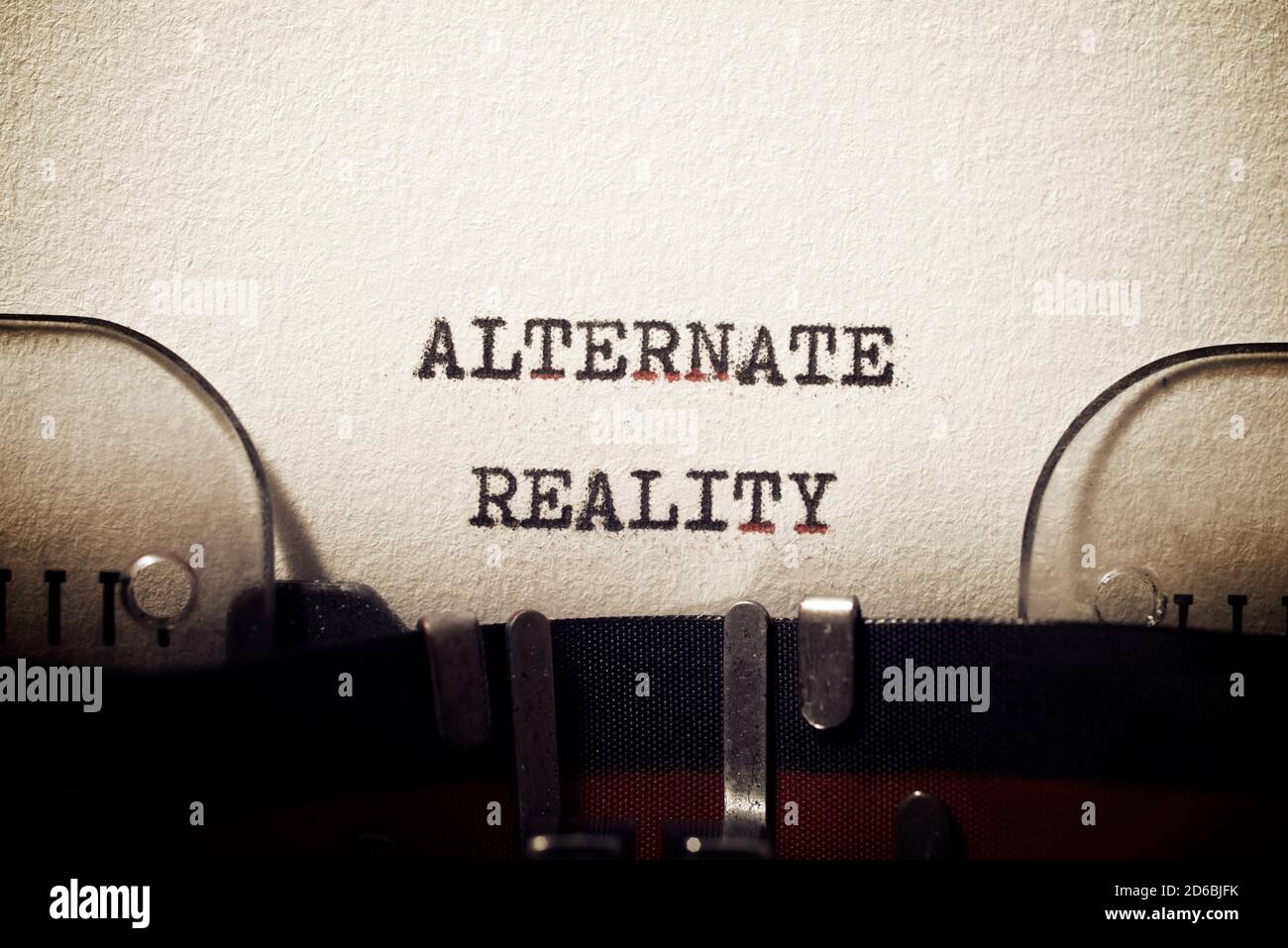 Alternate reality phrase written with a typewriter Stock Photo - Alamy