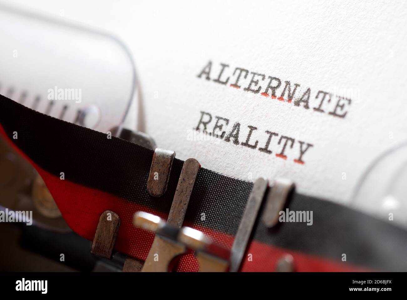 Alternate reality phrase written with a typewriter Stock Photo - Alamy