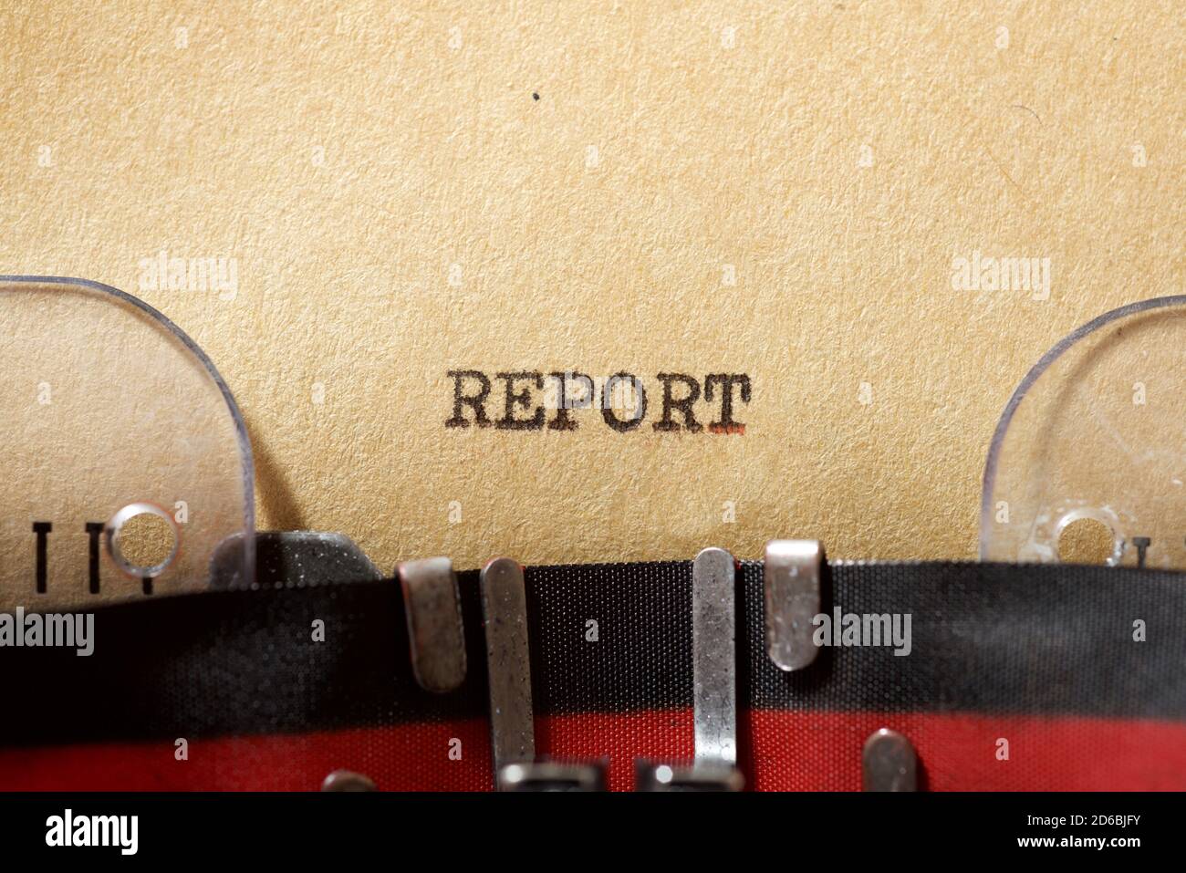 Report word written with a typewriter Stock Photo - Alamy