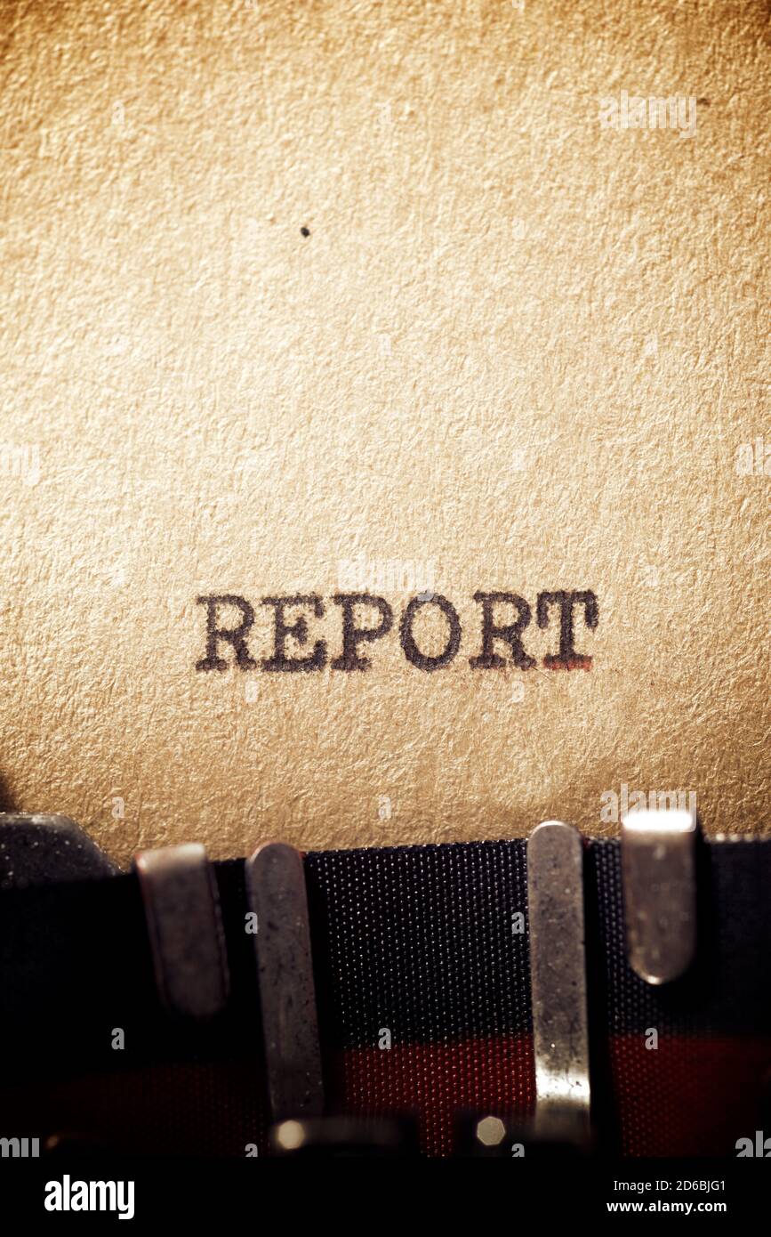 Report word written with a typewriter Stock Photo - Alamy