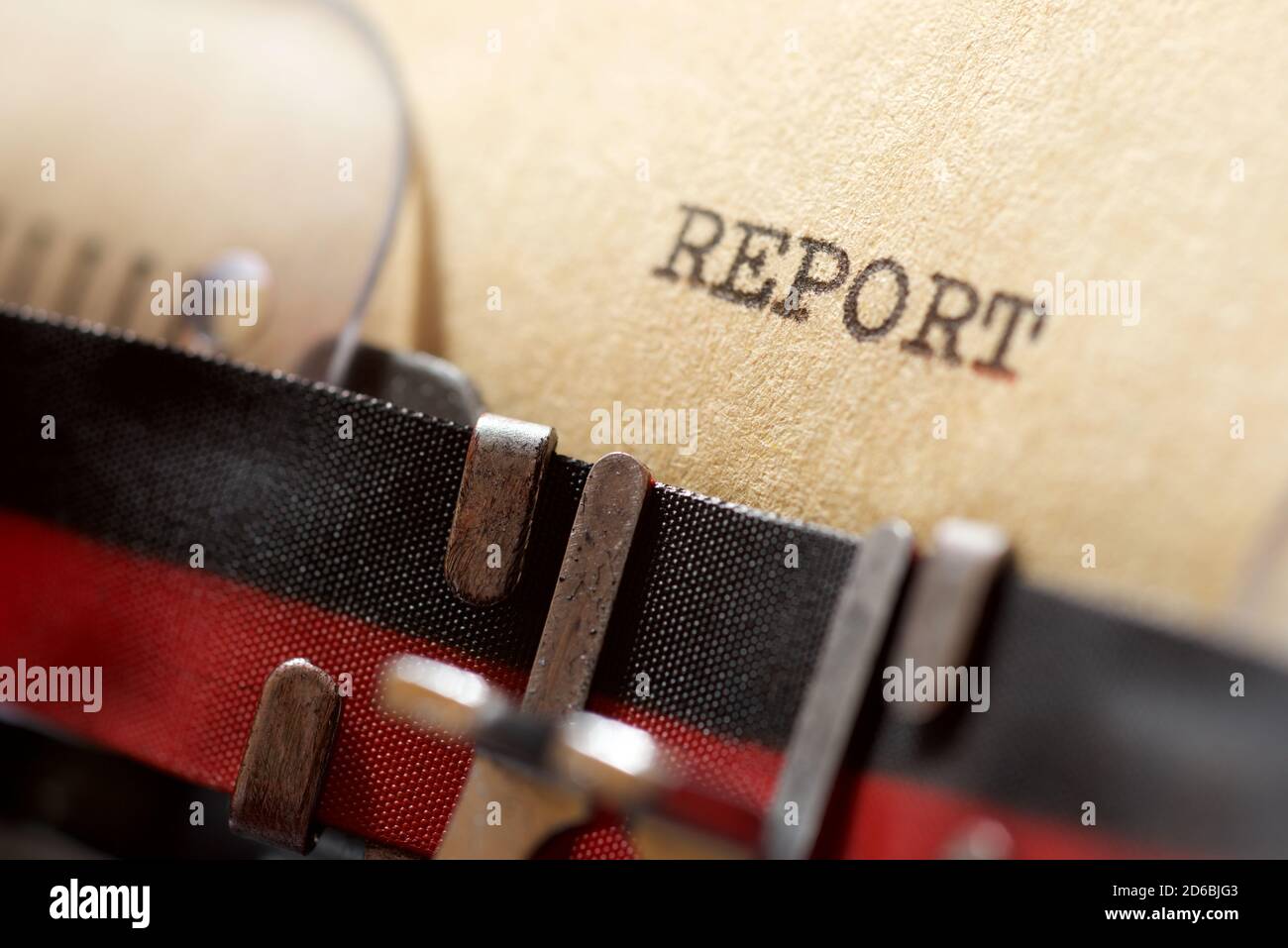 Report word written with a typewriter Stock Photo - Alamy