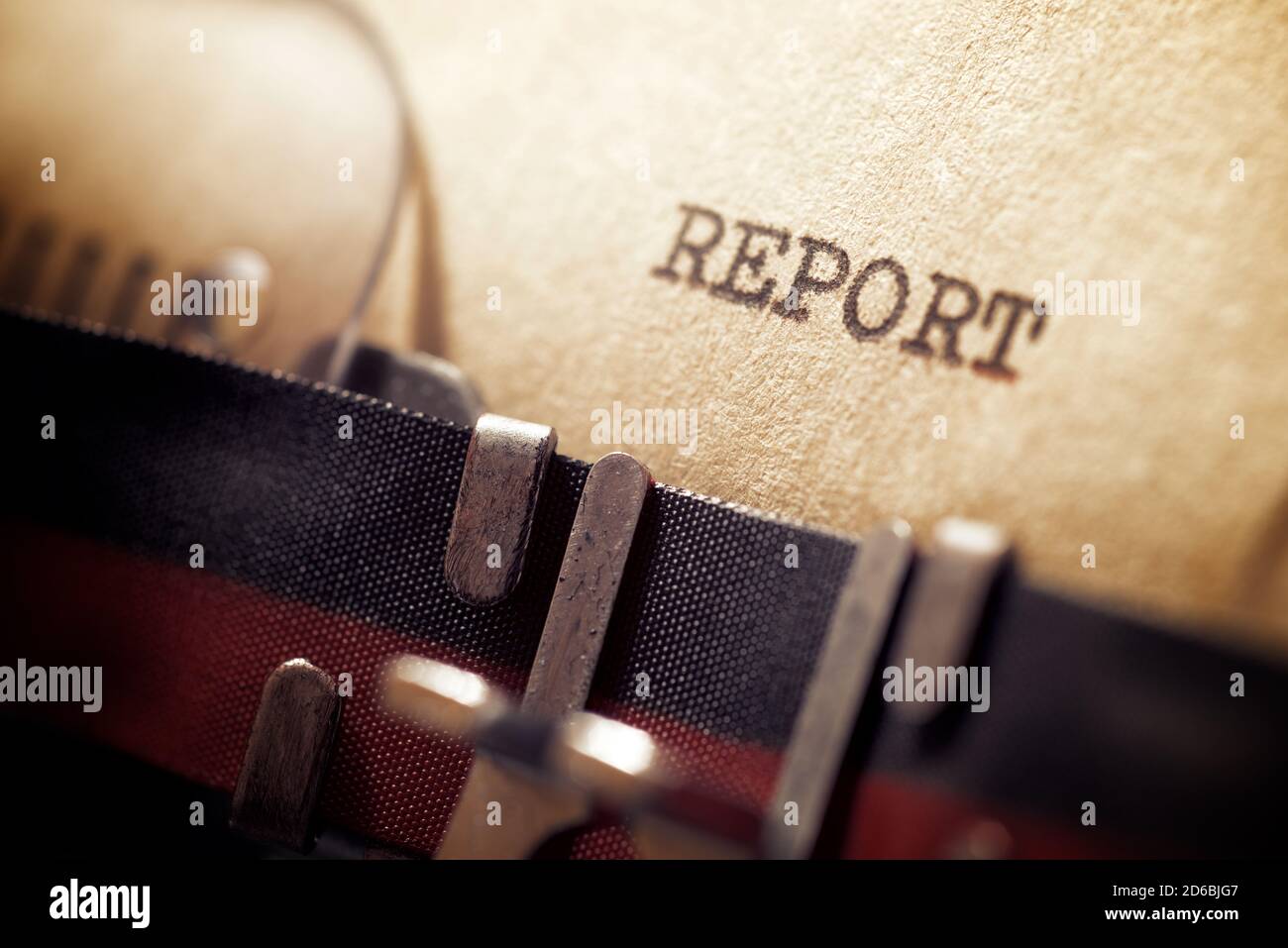 Report word written with a typewriter Stock Photo - Alamy