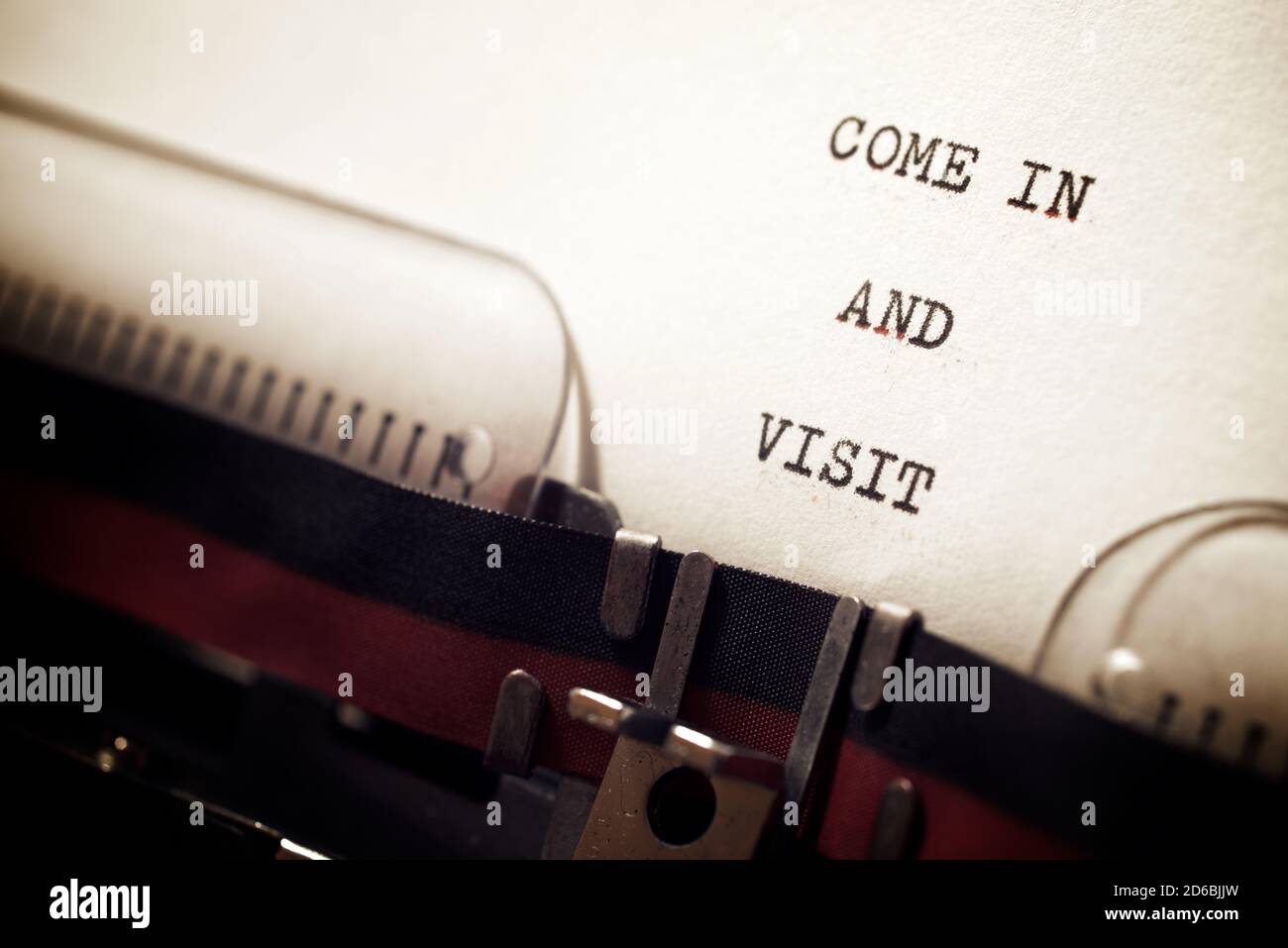 Come in and visit phrase written with a typewriter Stock Photo - Alamy